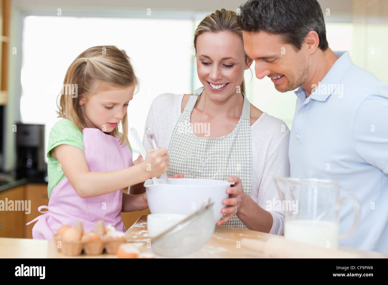 Family making cookies Stock Photo - Alamy