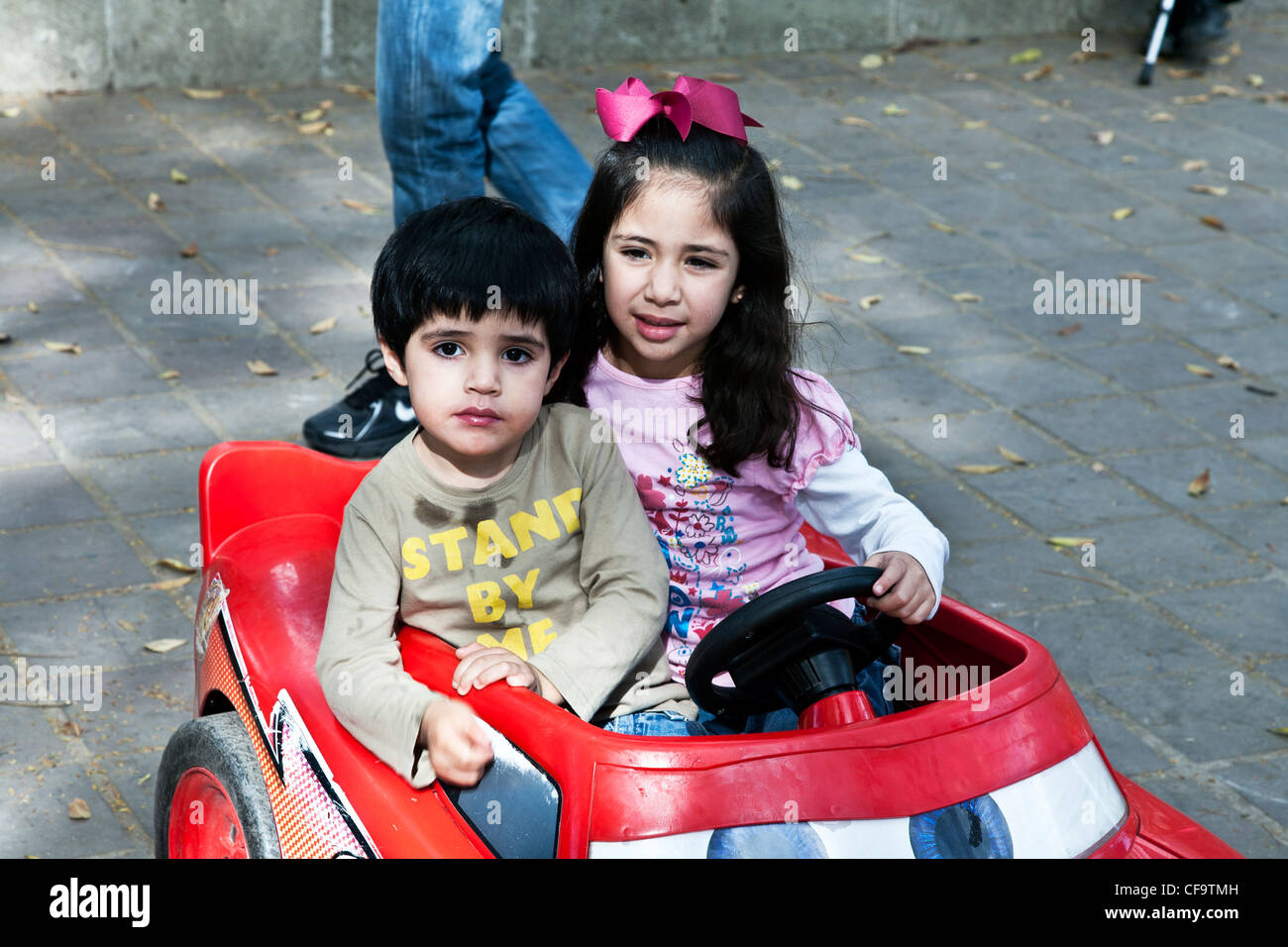 two small middle class Mexican siblings big sister & small brother ...