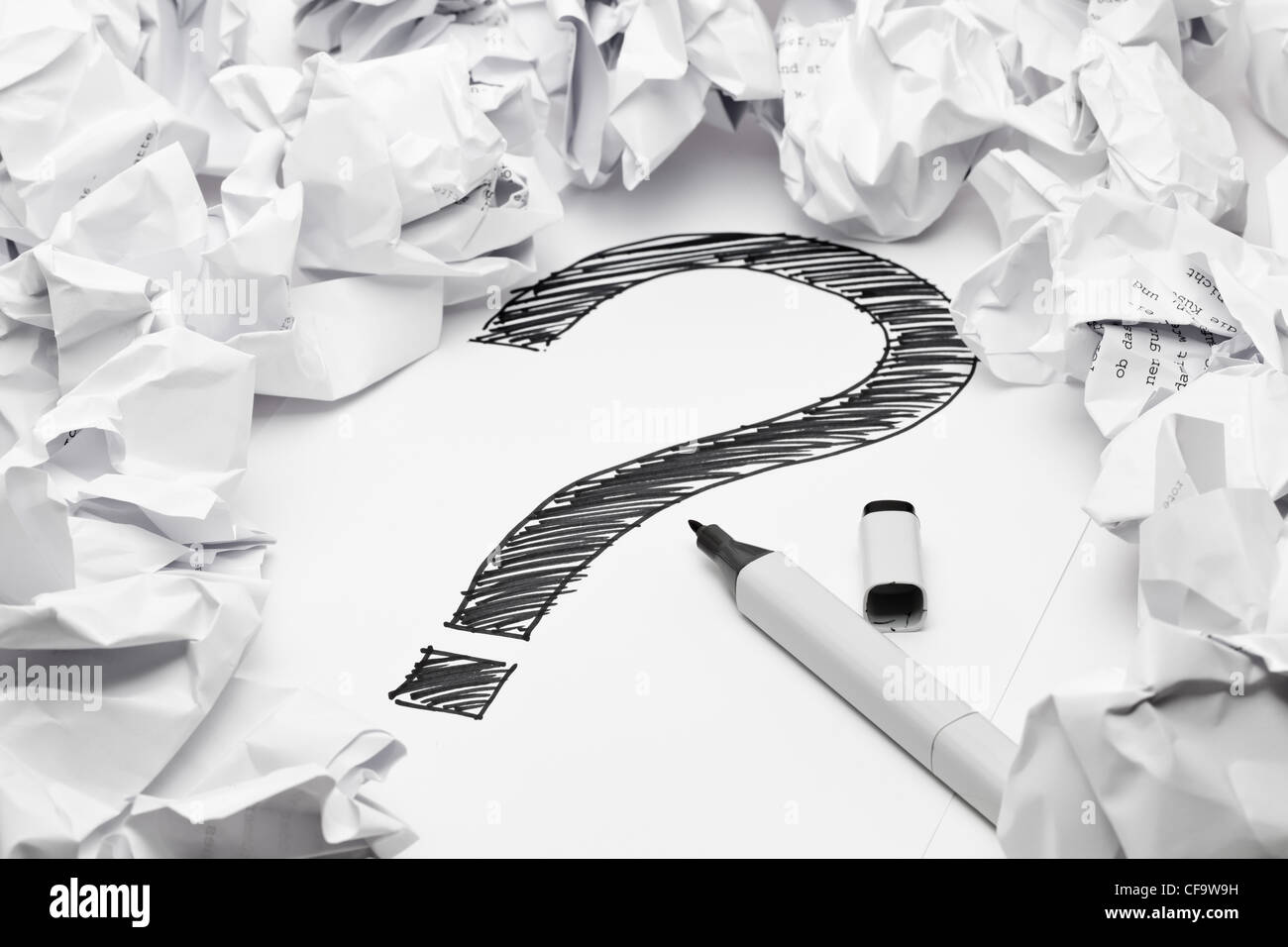 Question mark in the middle if crumpled papers - lack of inspiration ...