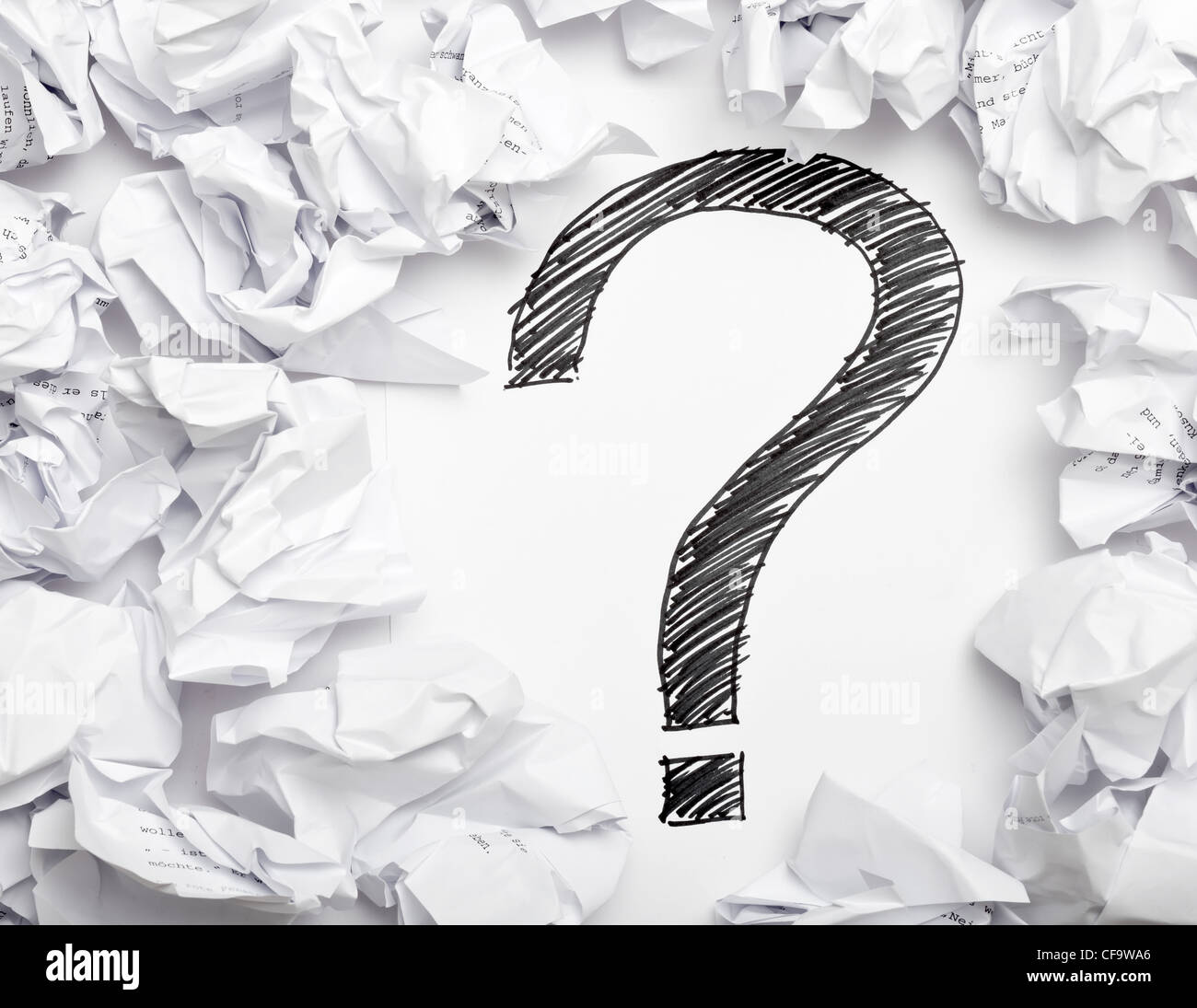 Question mark in the middle if crumpled papers - lack of inspiration ...