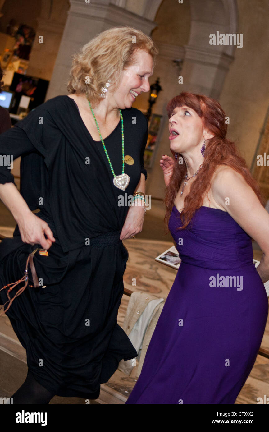 Two women clowning around on the dance floor Stock Photo - Alamy