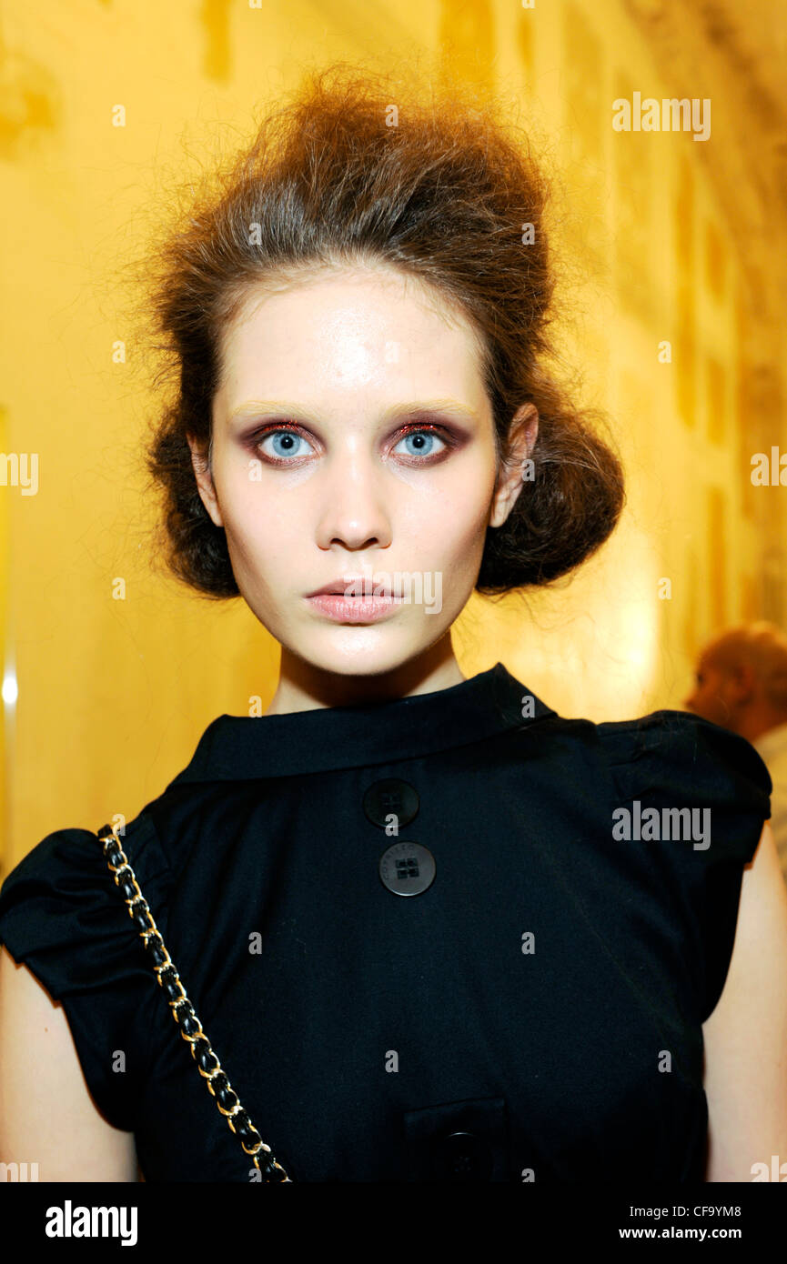 Milan Street Style A female wearing a black back to front style dress ...