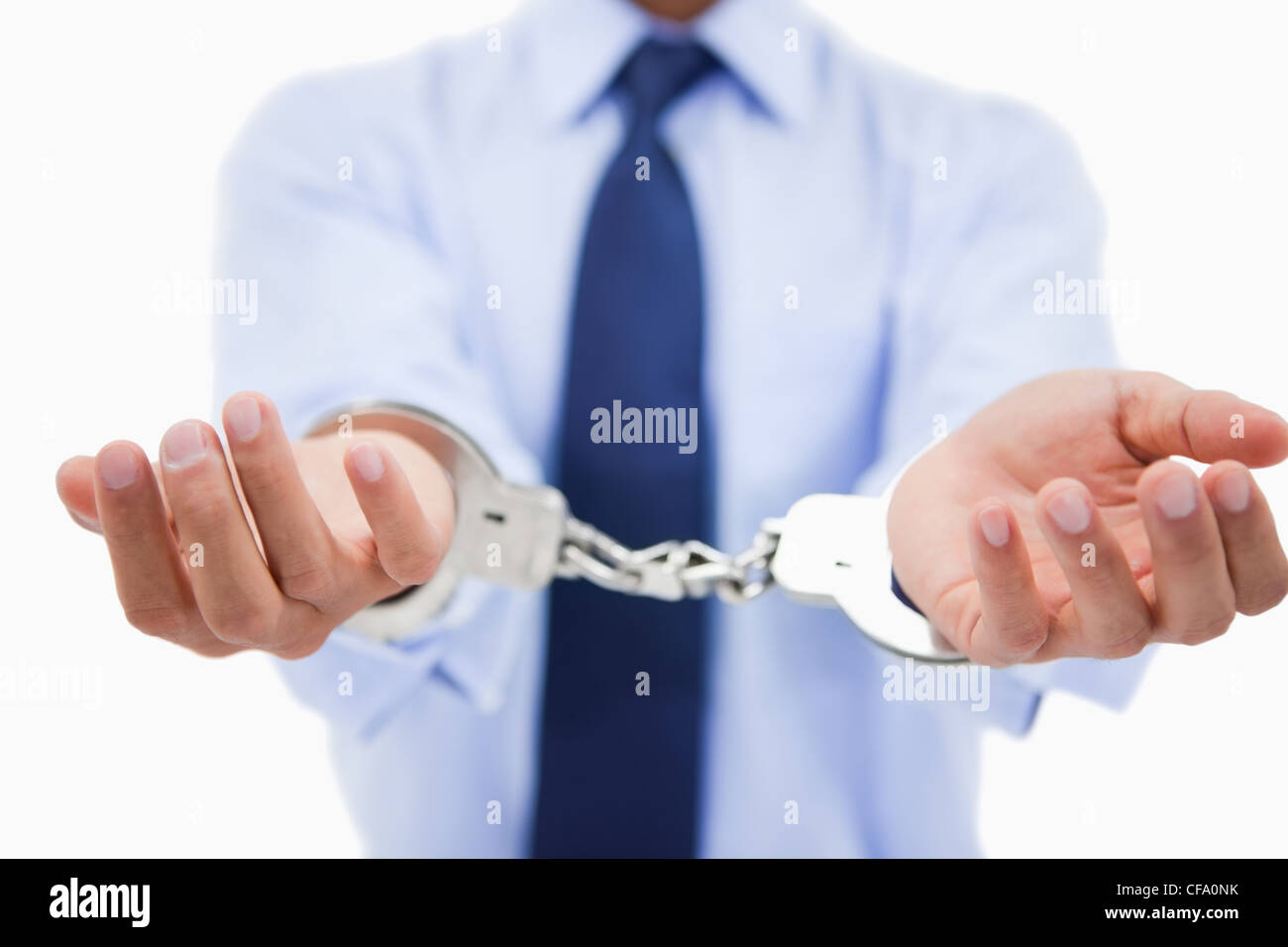 Close up of a professional's hands with handcuffs Stock Photo - Alamy