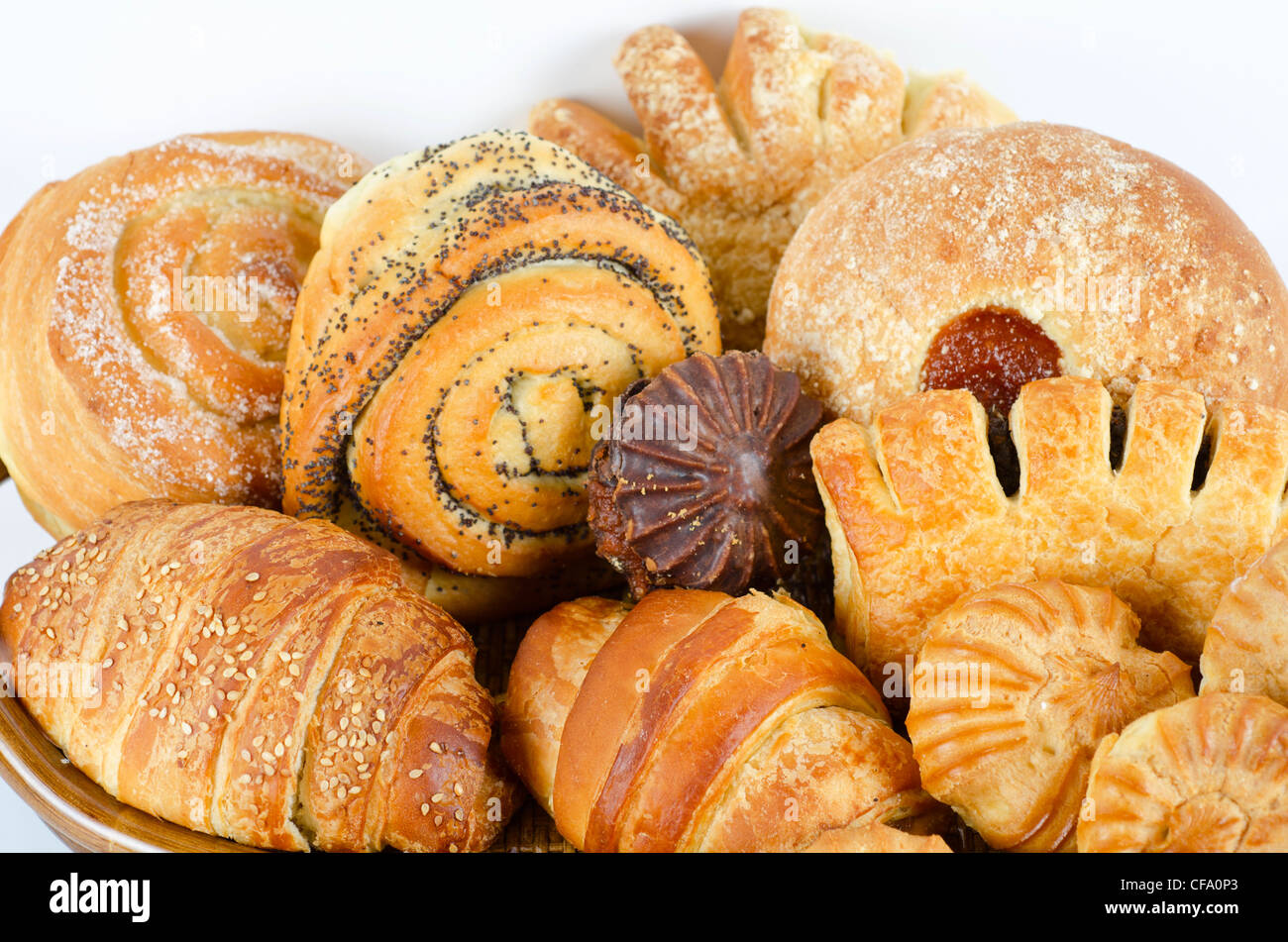 Bakery foodstuffs set on a white background Stock Photo - Alamy