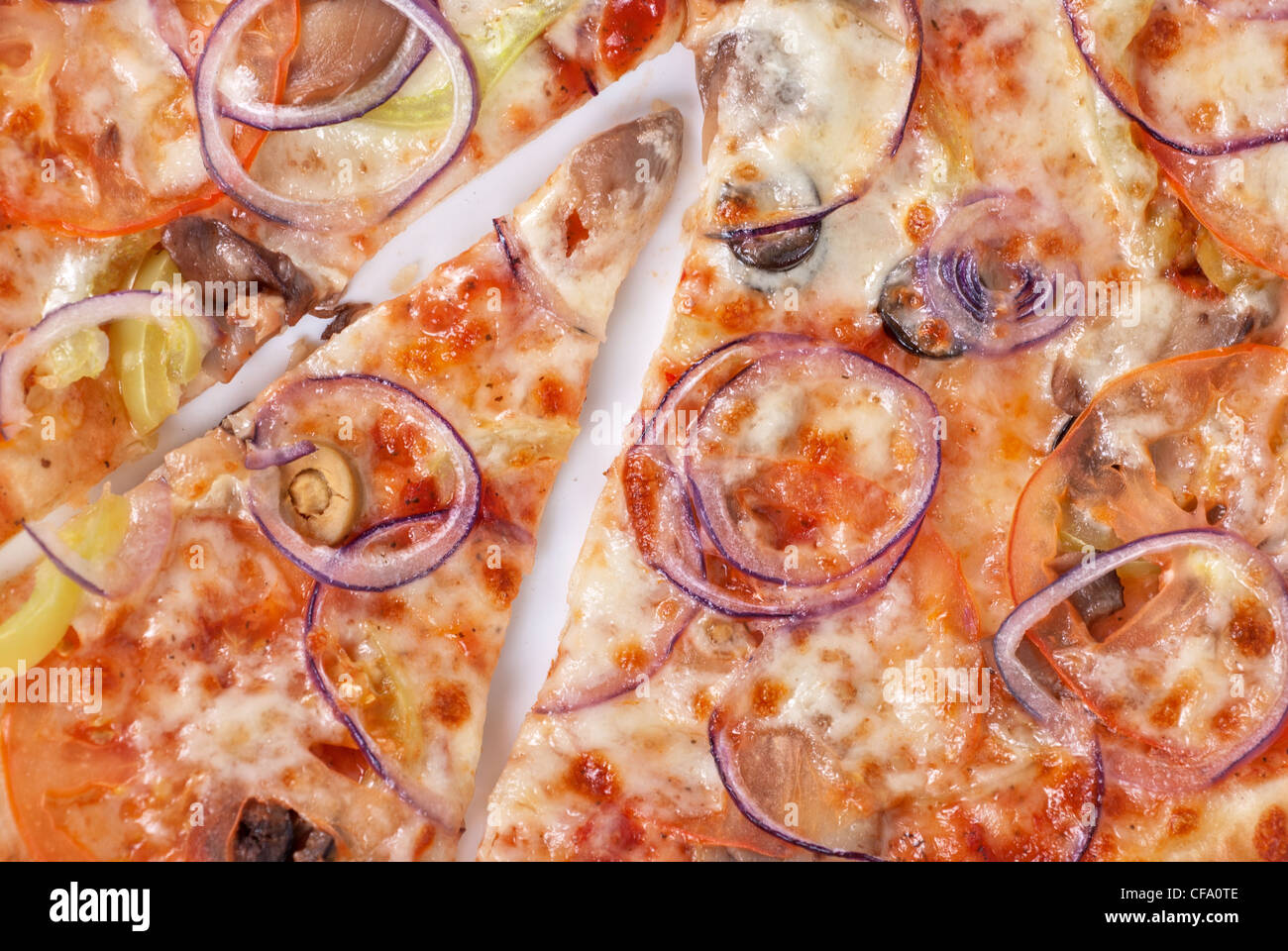 vegetable pizza closeup with tomato, Bulgarian pepper, onion, olive ...