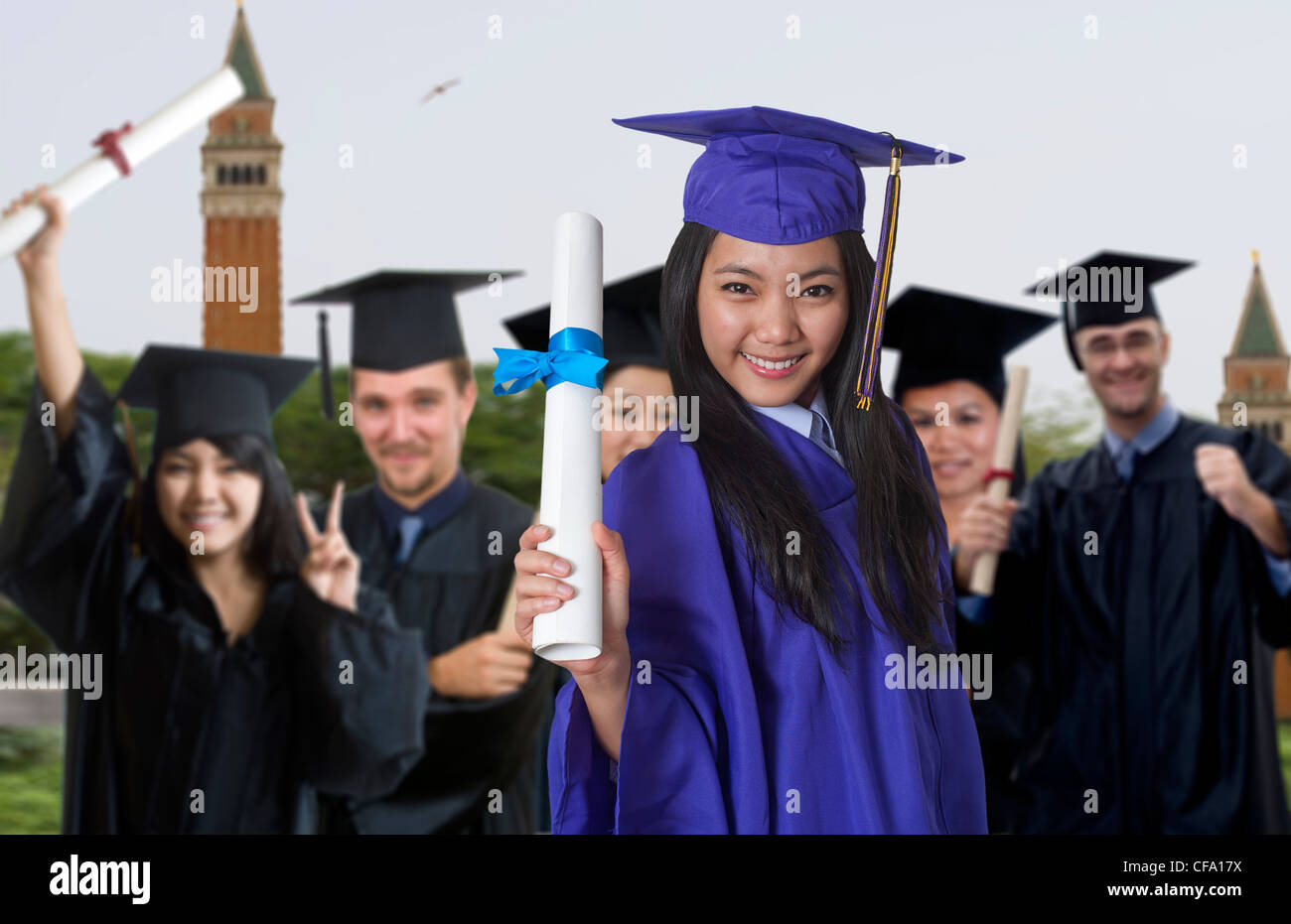 Young woman and her classmates with graduation cap and gown Stock Photo ...