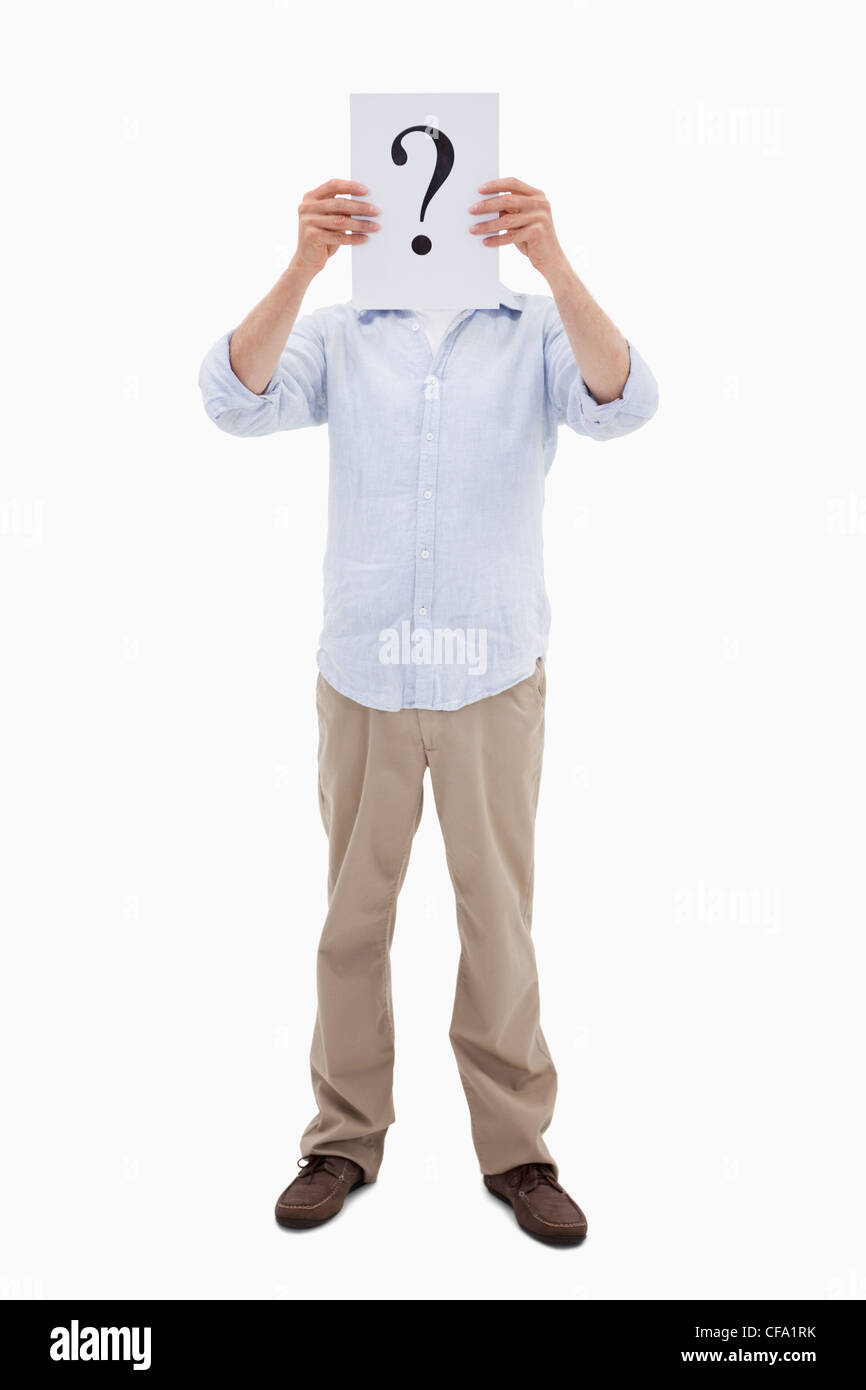 Portrait of a man holding a question mark on a paper Stock Photo - Alamy