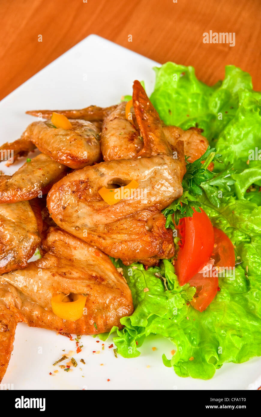 Crispy chicken wings greens hi-res stock photography and images - Alamy