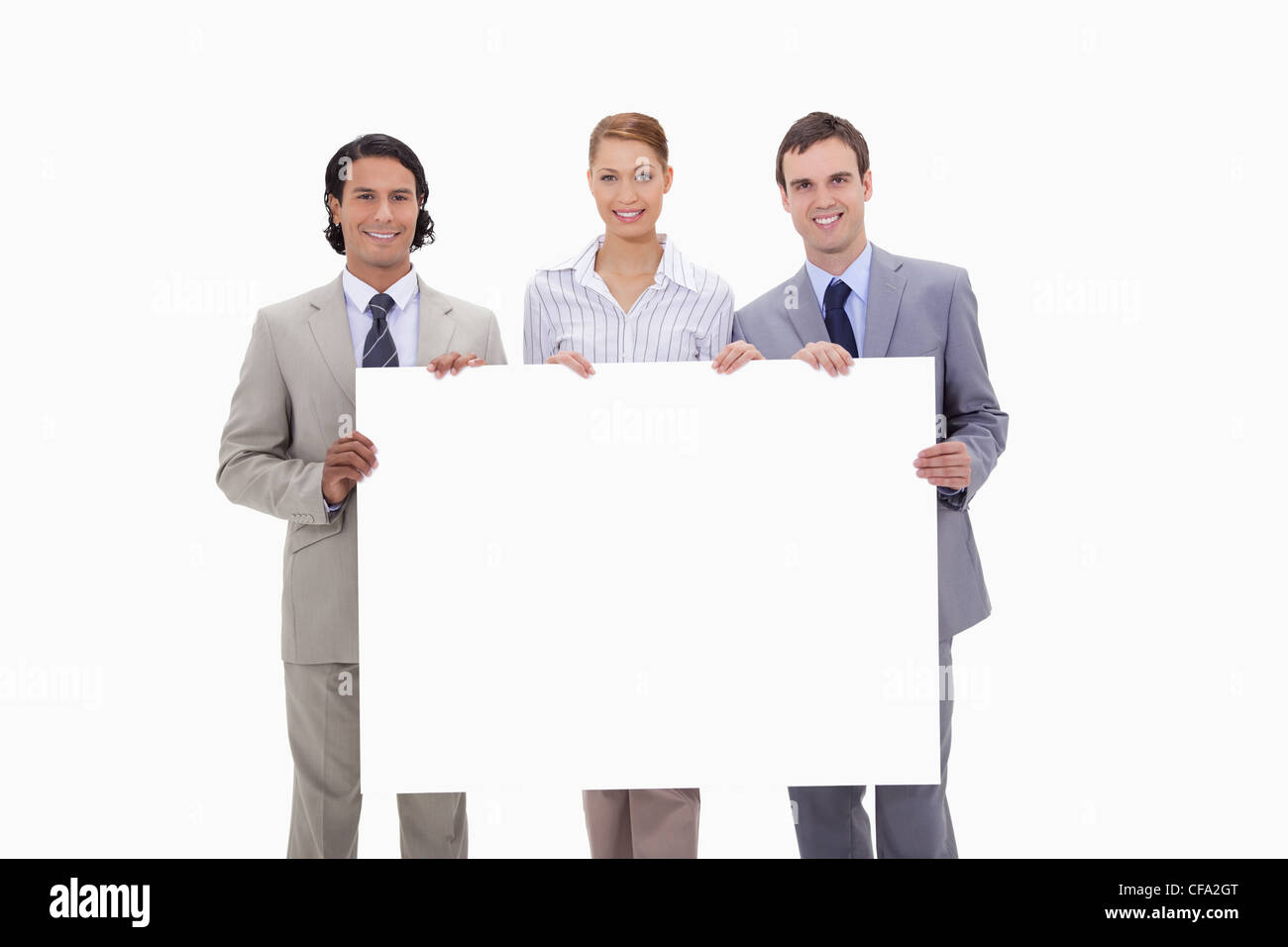 Business team holding blank sign Stock Photo - Alamy