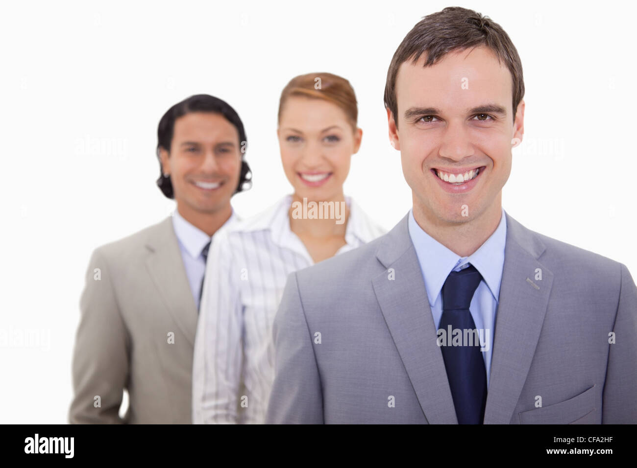 Smiling Business team lined up Stock Photo - Alamy
