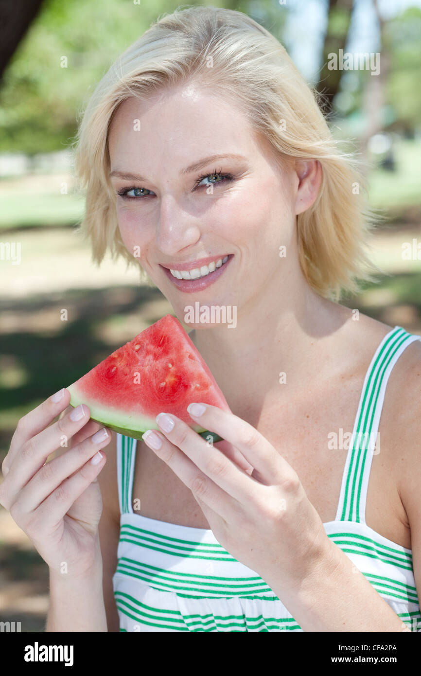 Female eating watermelon Stock Photo - Alamy