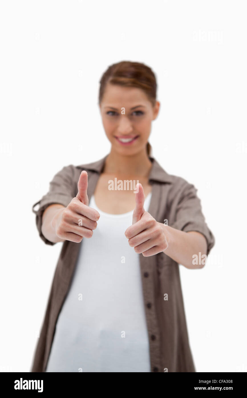 Woman giving thumbs up Stock Photo - Alamy