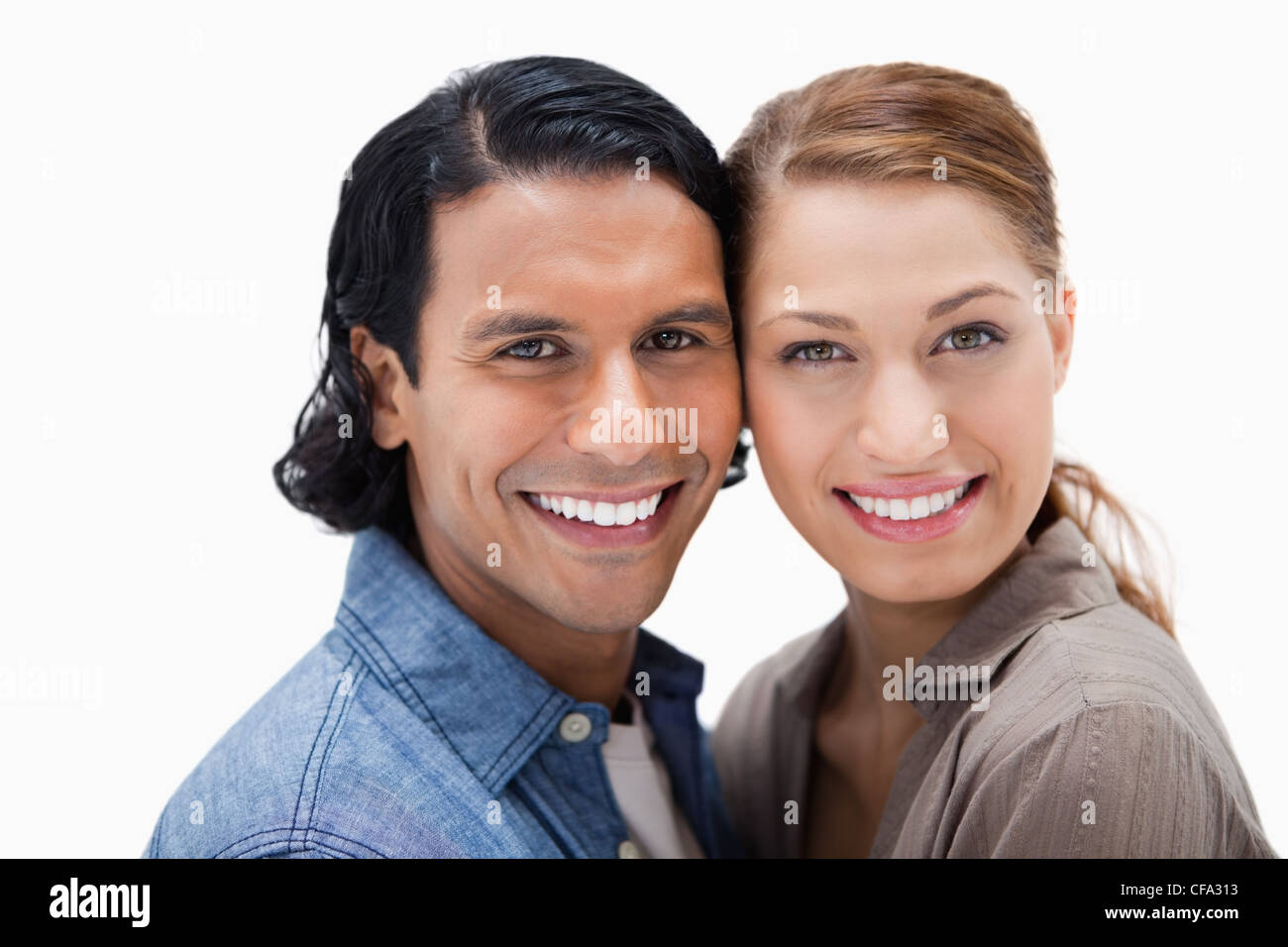 Joyful couple standing together smiling hi-res stock photography and ...