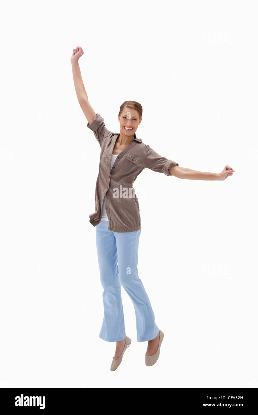 Happy woman jumping Stock Photo - Alamy