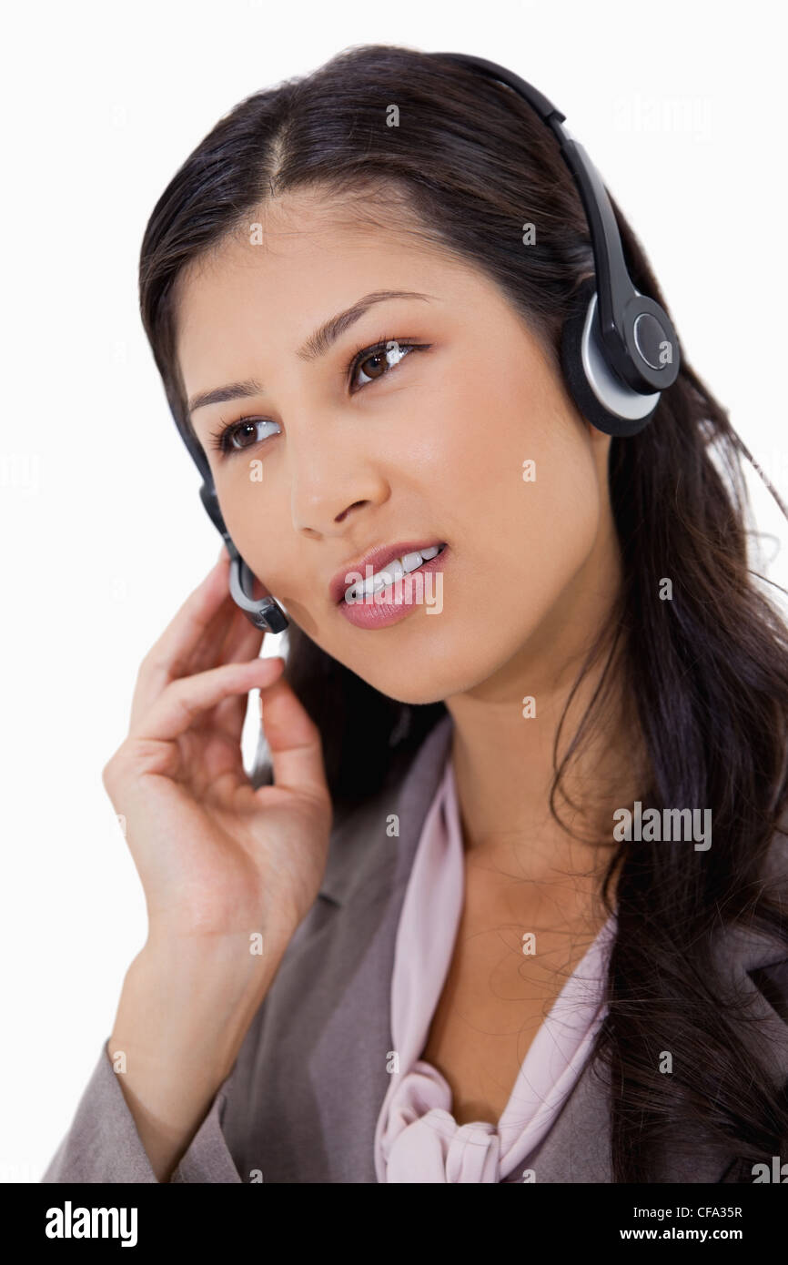 Businesswoman using headset Stock Photo - Alamy