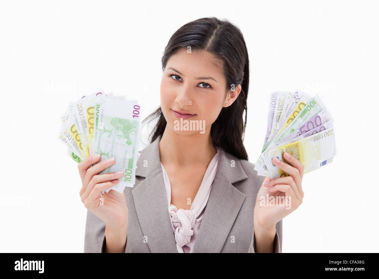 Businesswoman holding money in her hands Stock Photo - Alamy