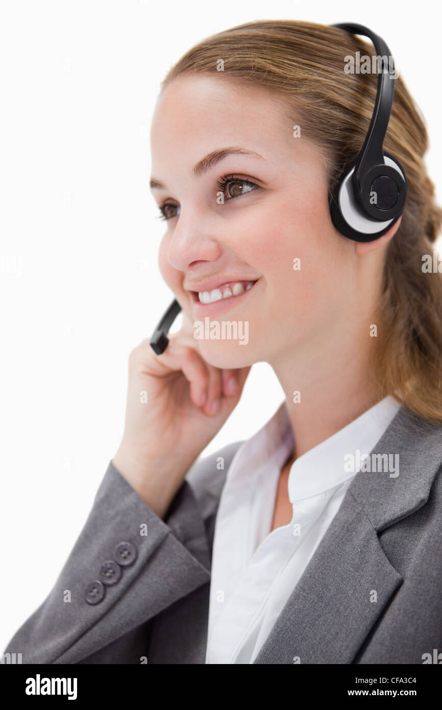 Side view of listening call center agent with headset on Stock Photo ...