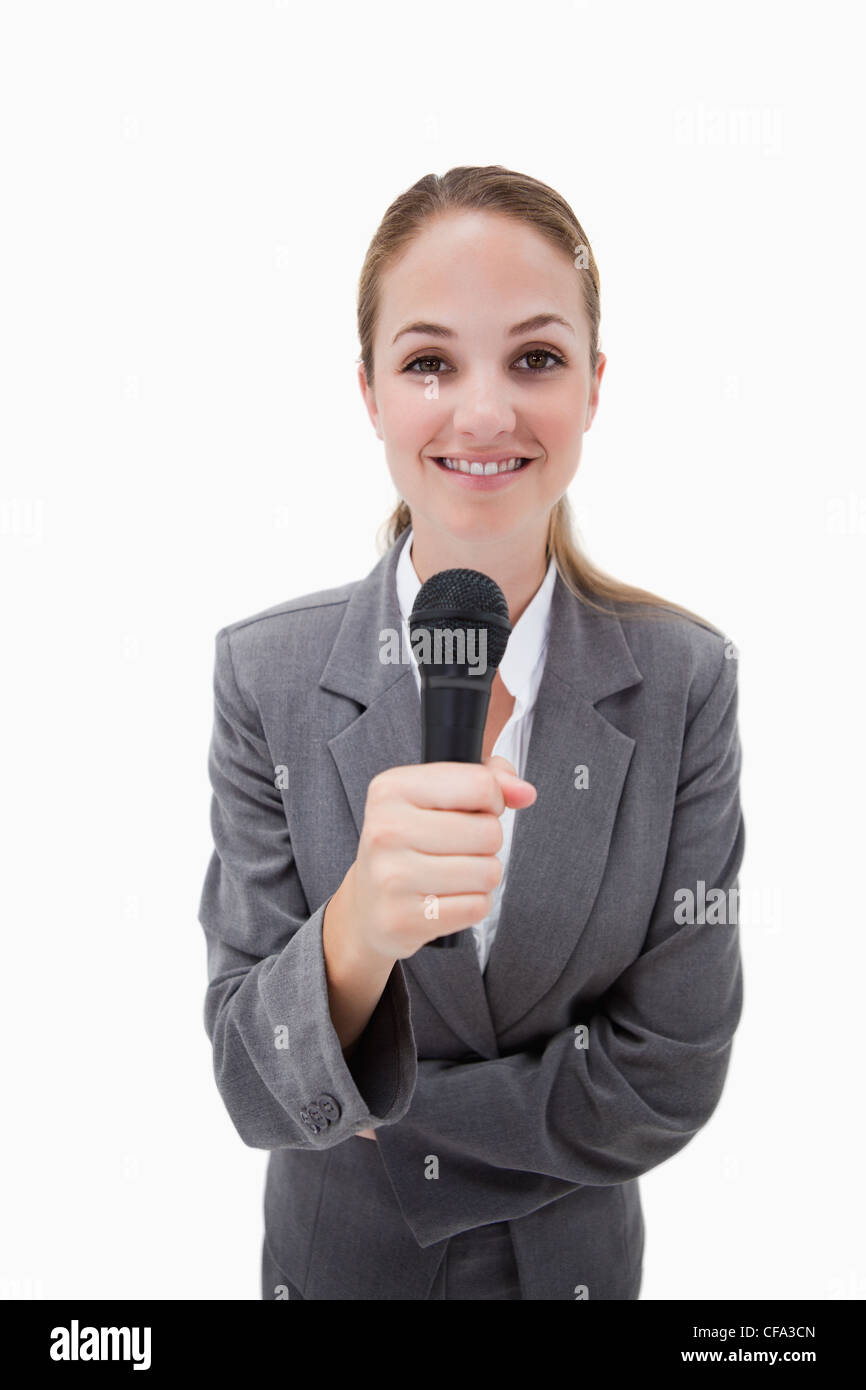 Woman holding microphone hi-res stock photography and images - Alamy