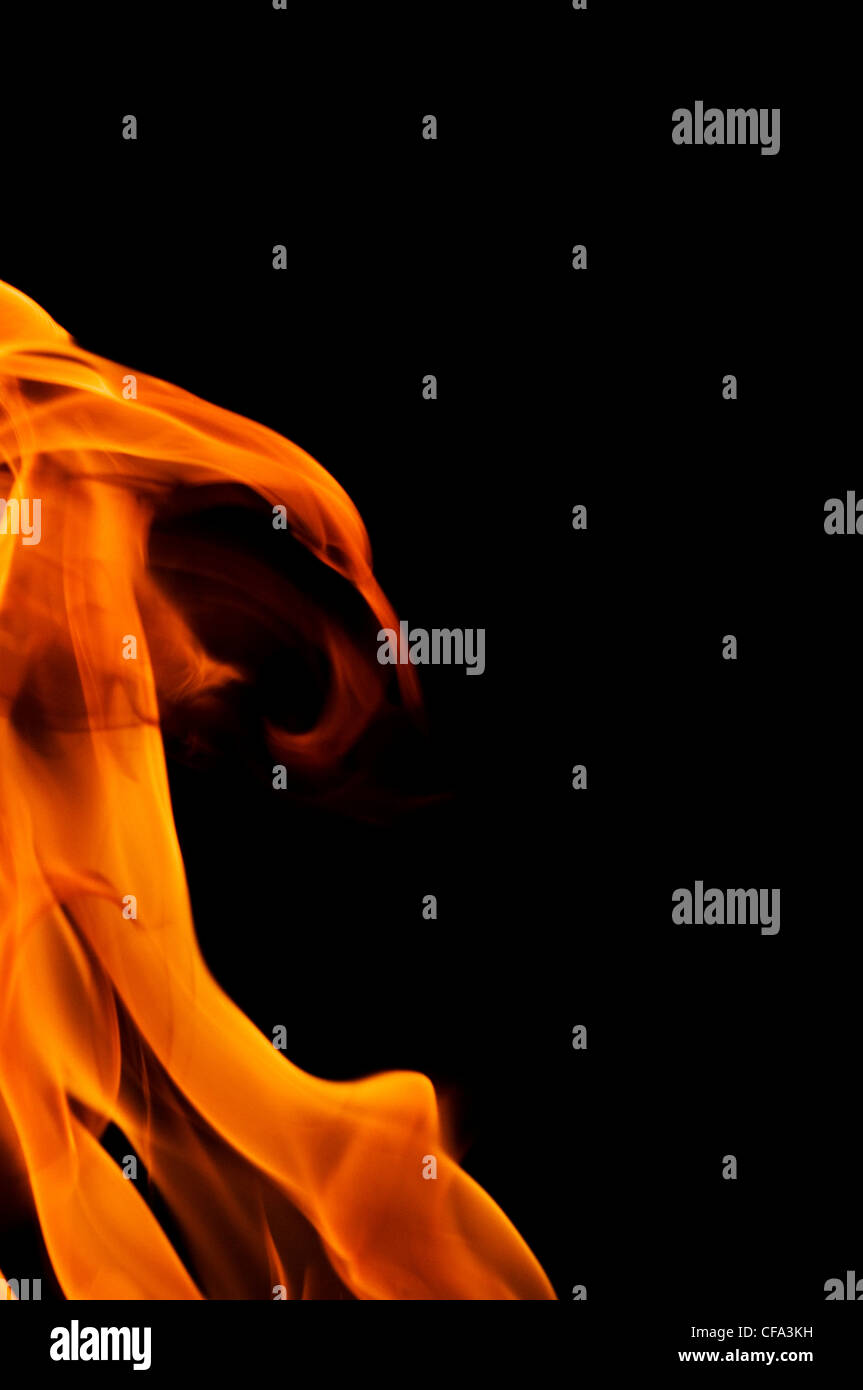 fire with a black background, abstract background Stock Photo - Alamy