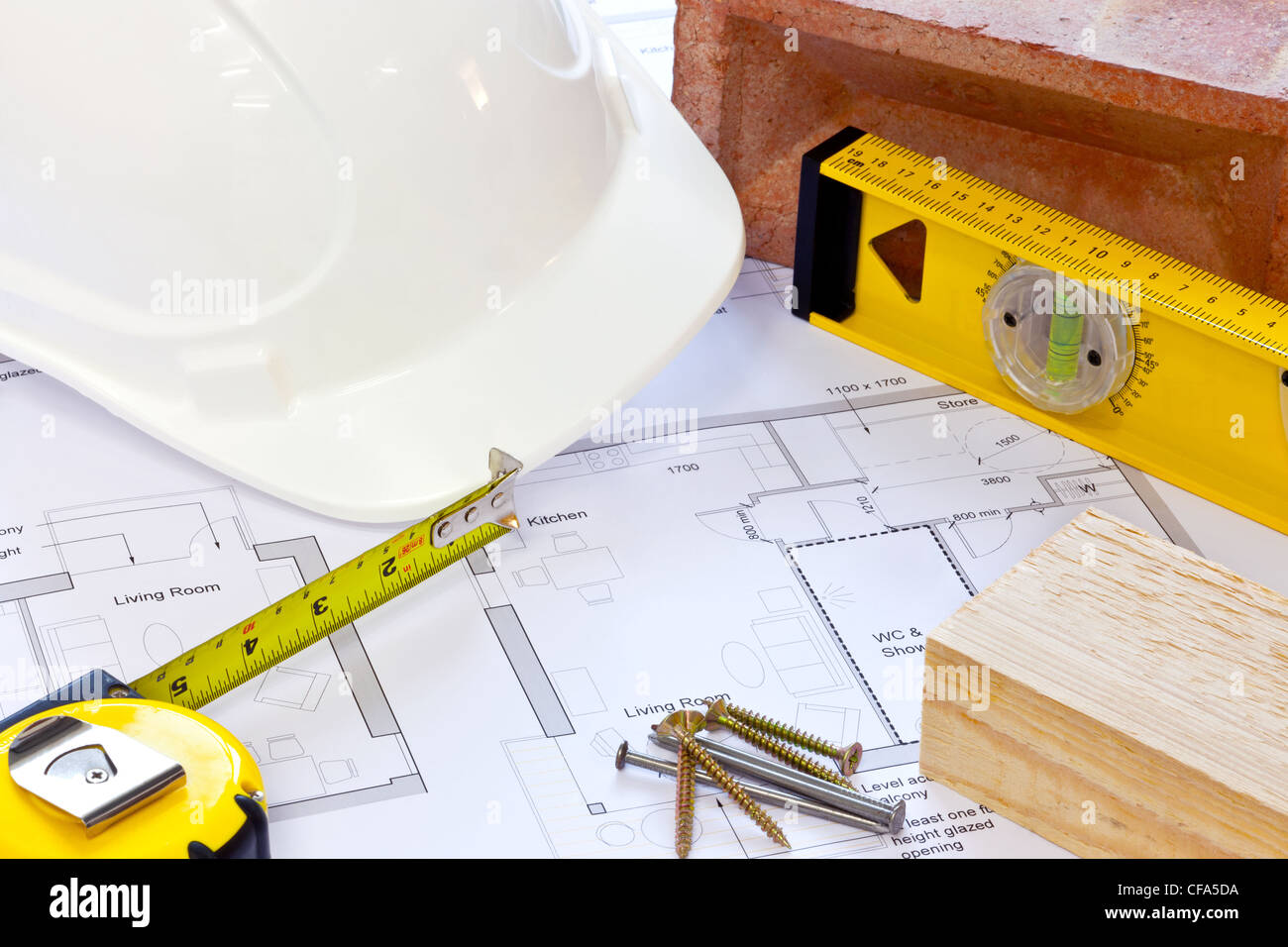 Still life photo of building plans and tools Stock Photo - Alamy