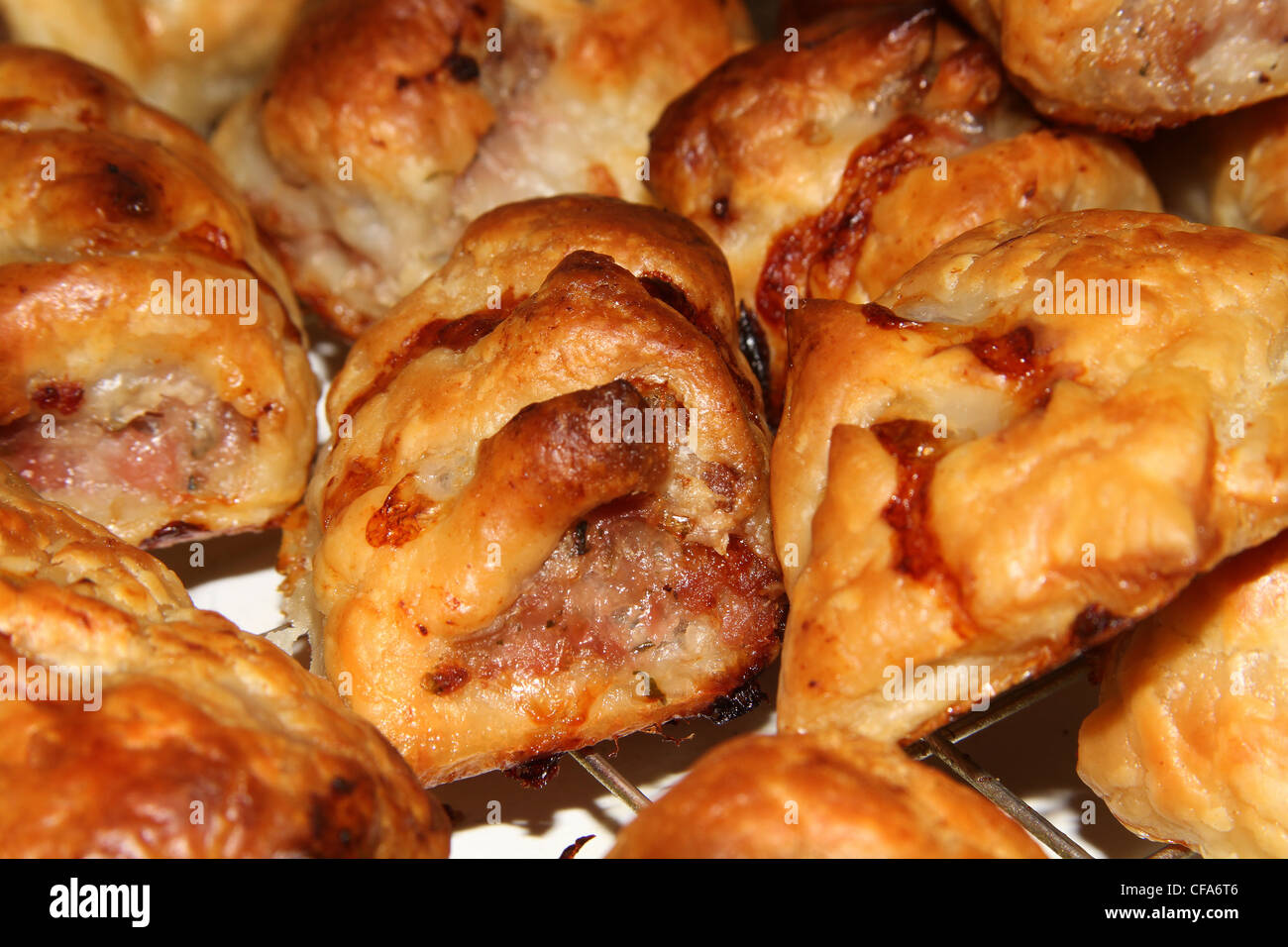 Freshly cooked small sausage rolls Stock Photo - Alamy