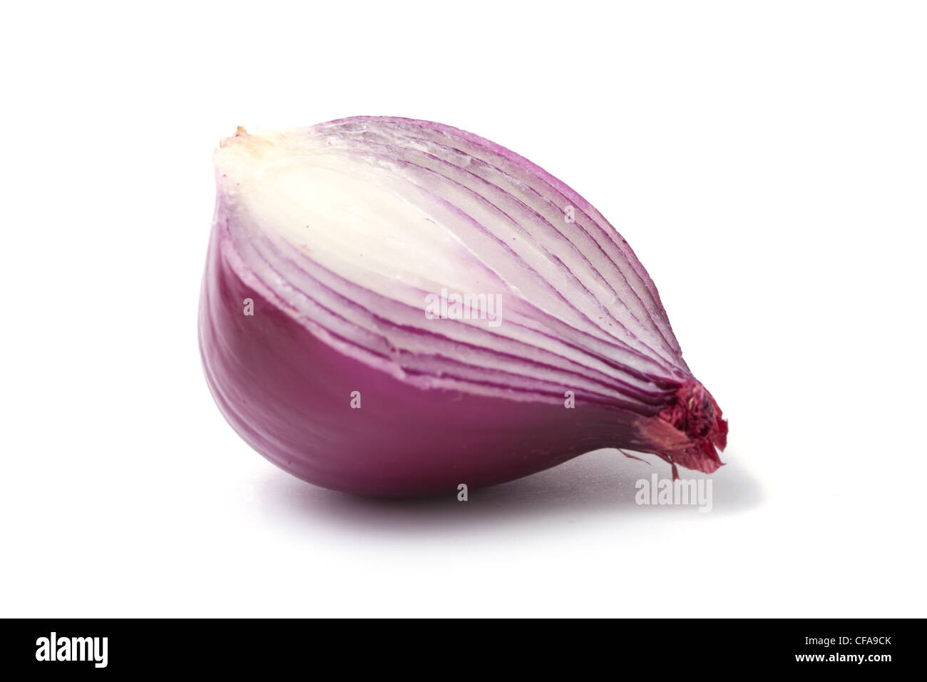 Sliced and peeled red onion isolated on white background with shadow ...