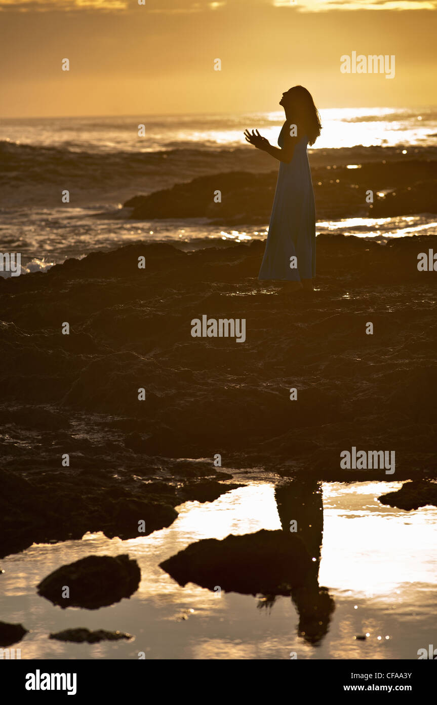 Woman standing on rock formations Stock Photo - Alamy