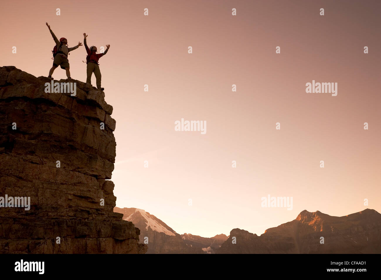Two men hiking mountains sunset hi-res stock photography and images - Alamy