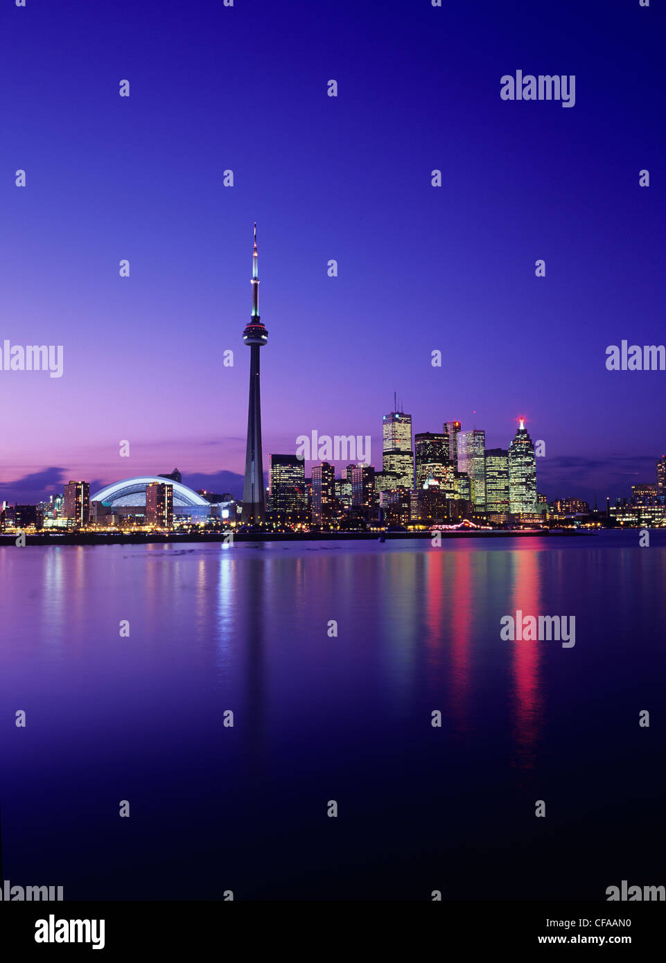 skyline view from toronto islands at twilight, toronto, ontario, canada ...