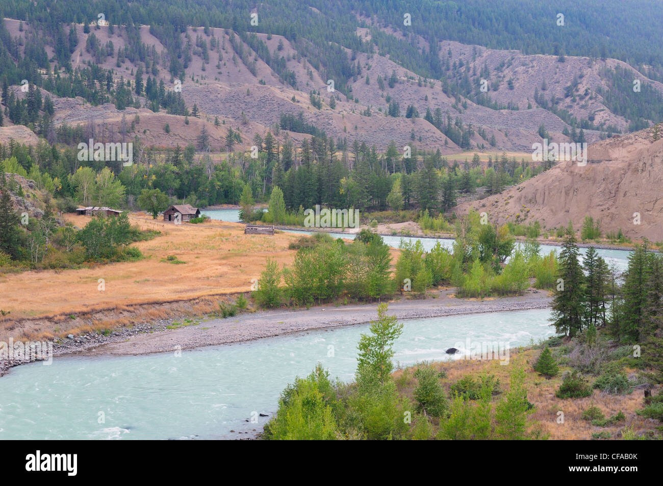 Sunset over log cabin at the 108 Mile Heritage Site in 108 Mile House ...