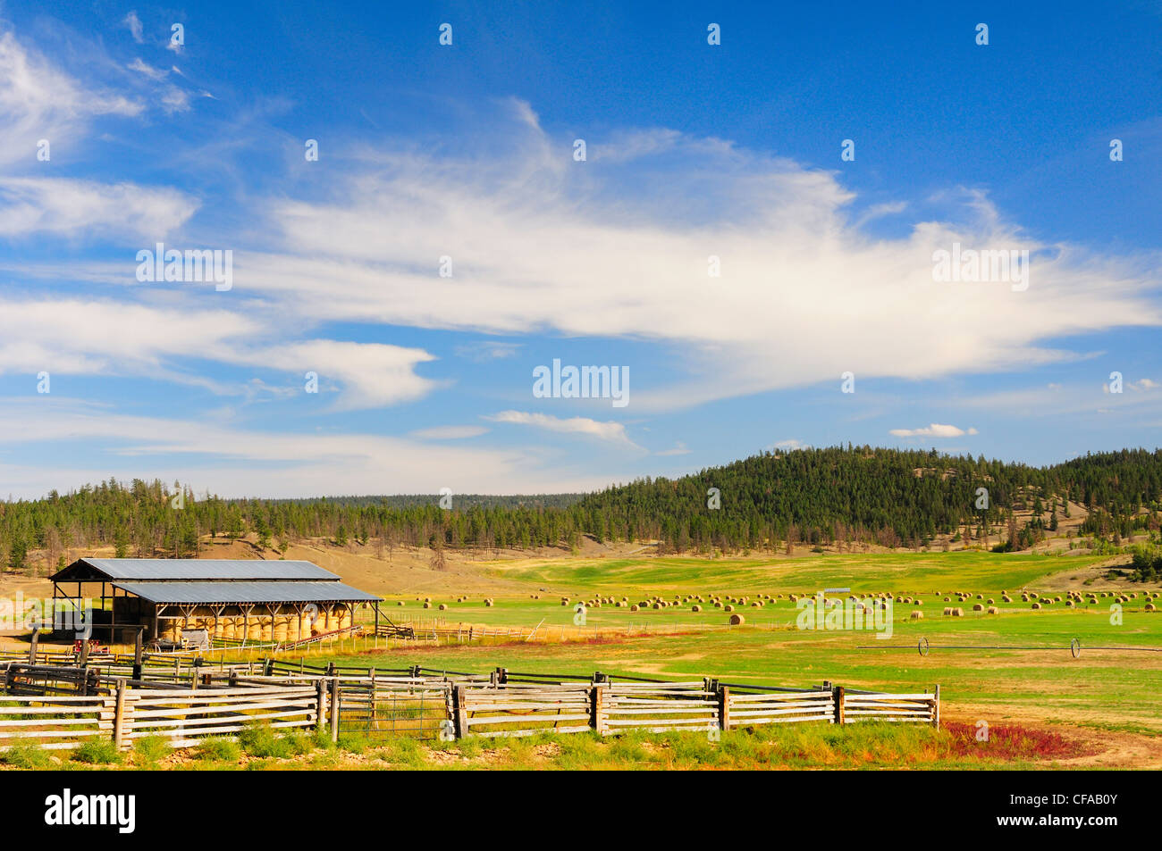 Fencing, irrigation system and hay bales on farmland near Clinton ...