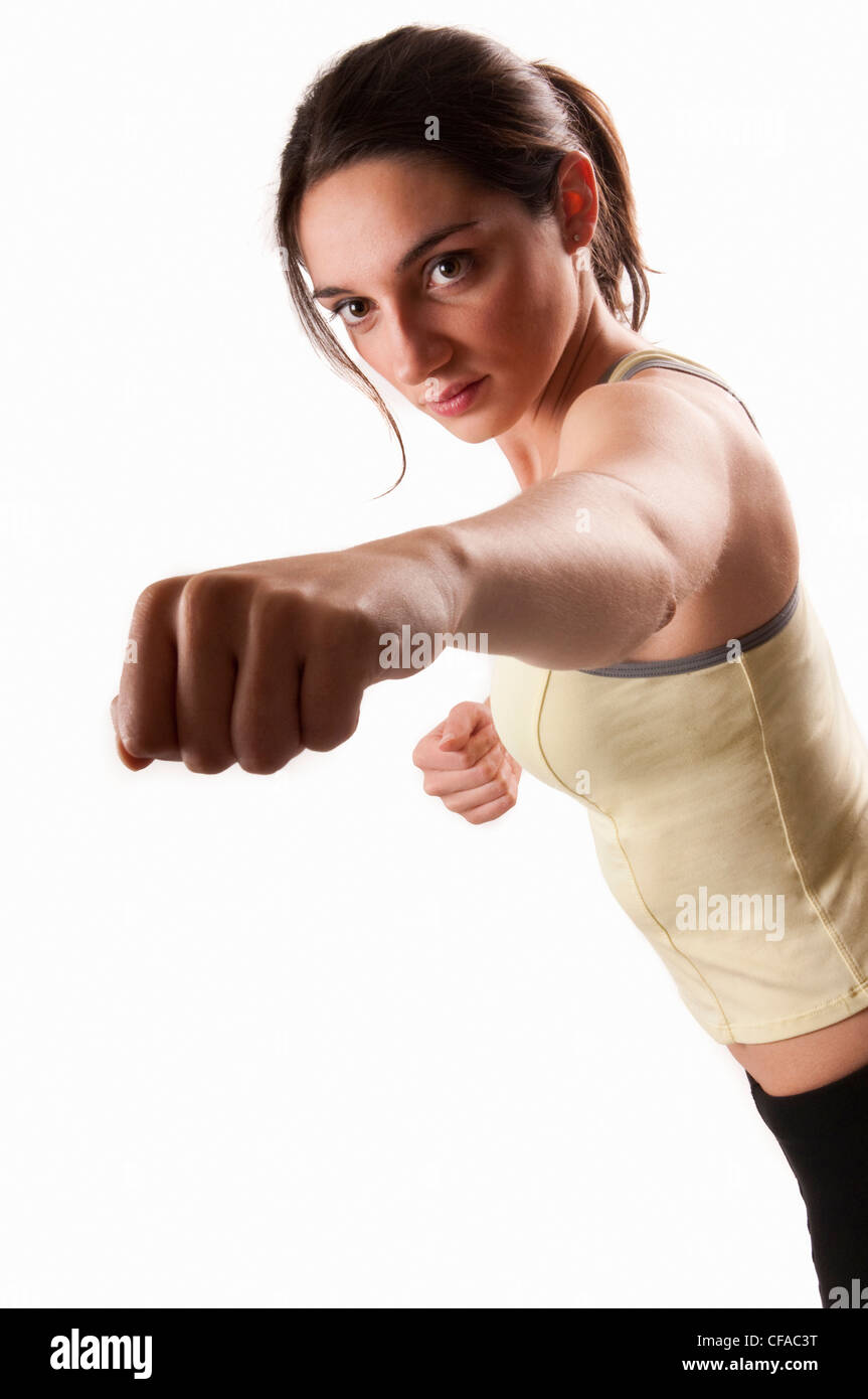 Runner punching with fist Stock Photo - Alamy