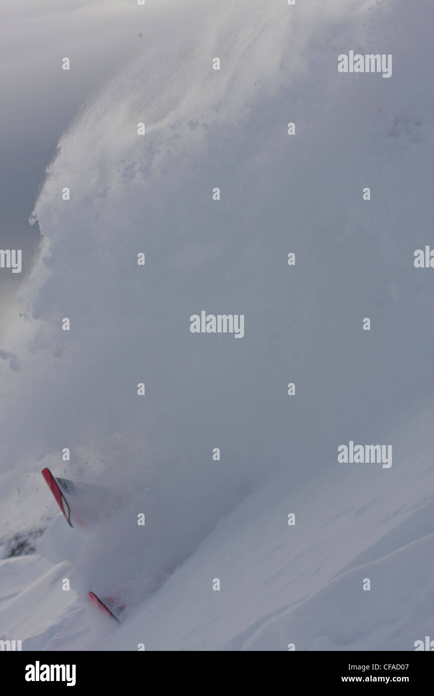 A male skier makes powder turns in the Sunshine Village Backcountry ...