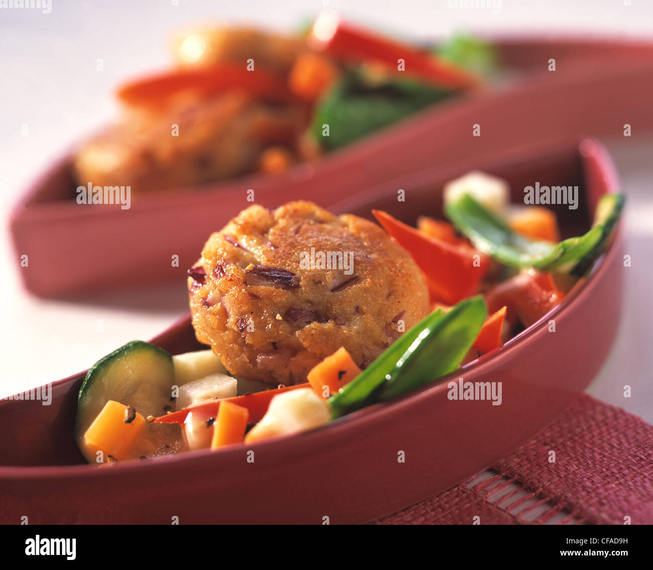 Curd rissoles with marinated vegetable Stock Photo - Alamy