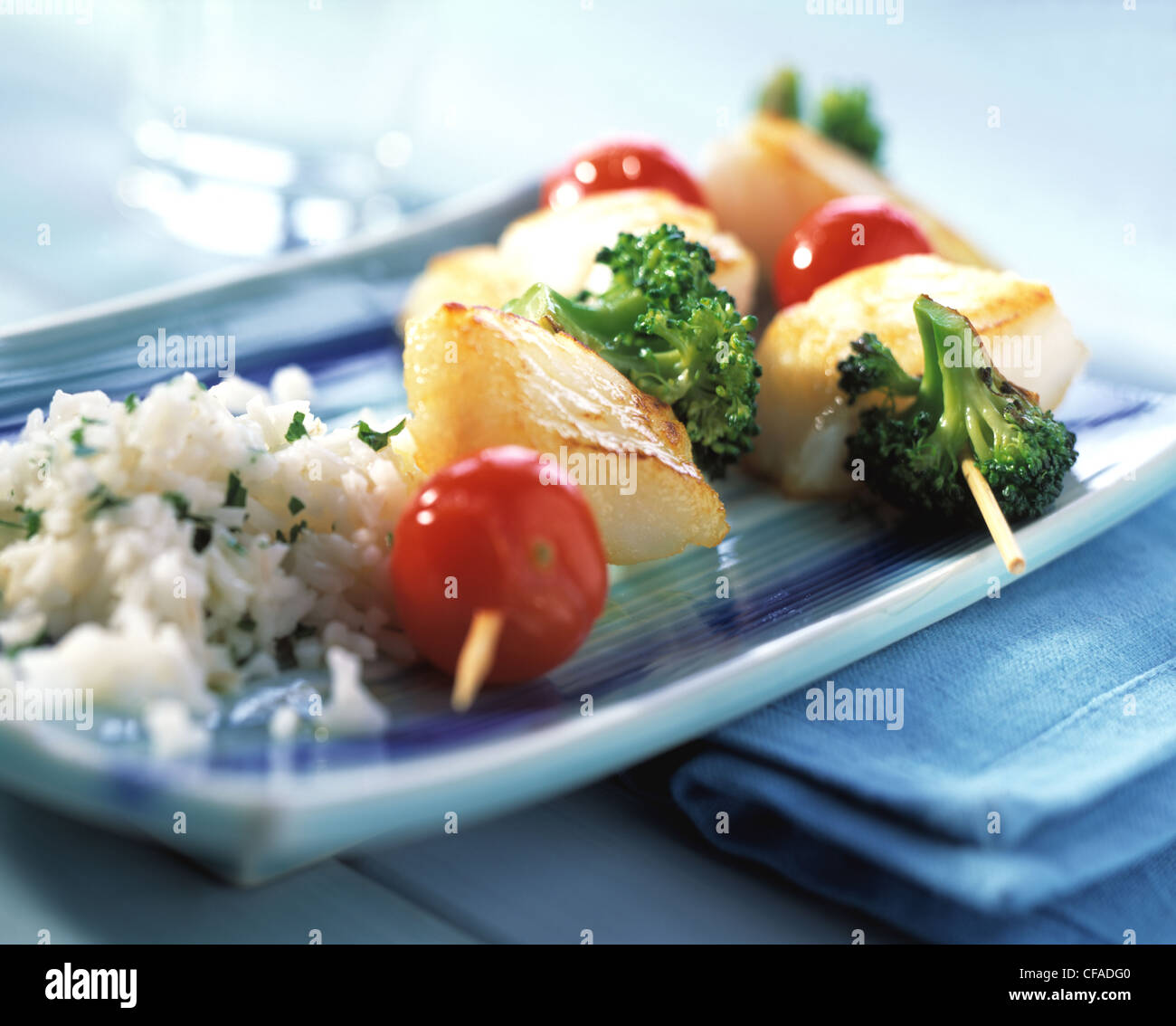 Fish vegetable spit with herbal rice Stock Photo - Alamy