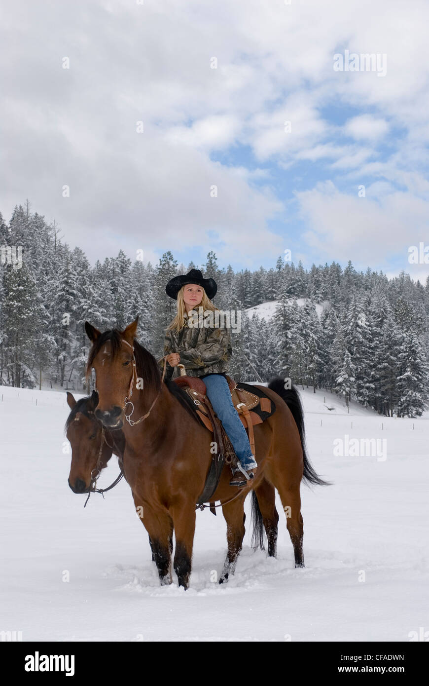Young Cowgirl Horseback Riding In Stock Photos & Young Cowgirl ...
