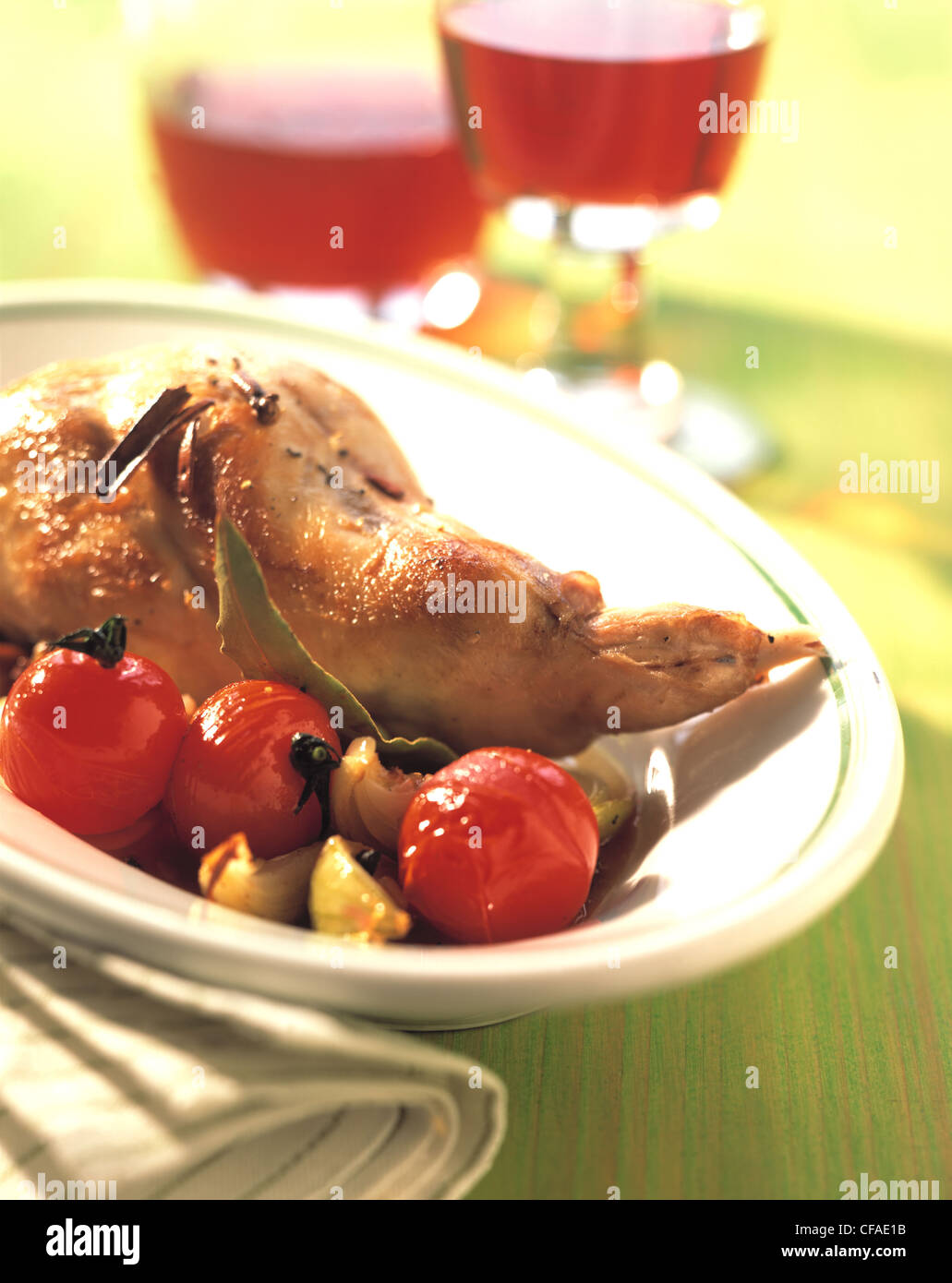 Steamed rabbit haunch greek style Stock Photo - Alamy
