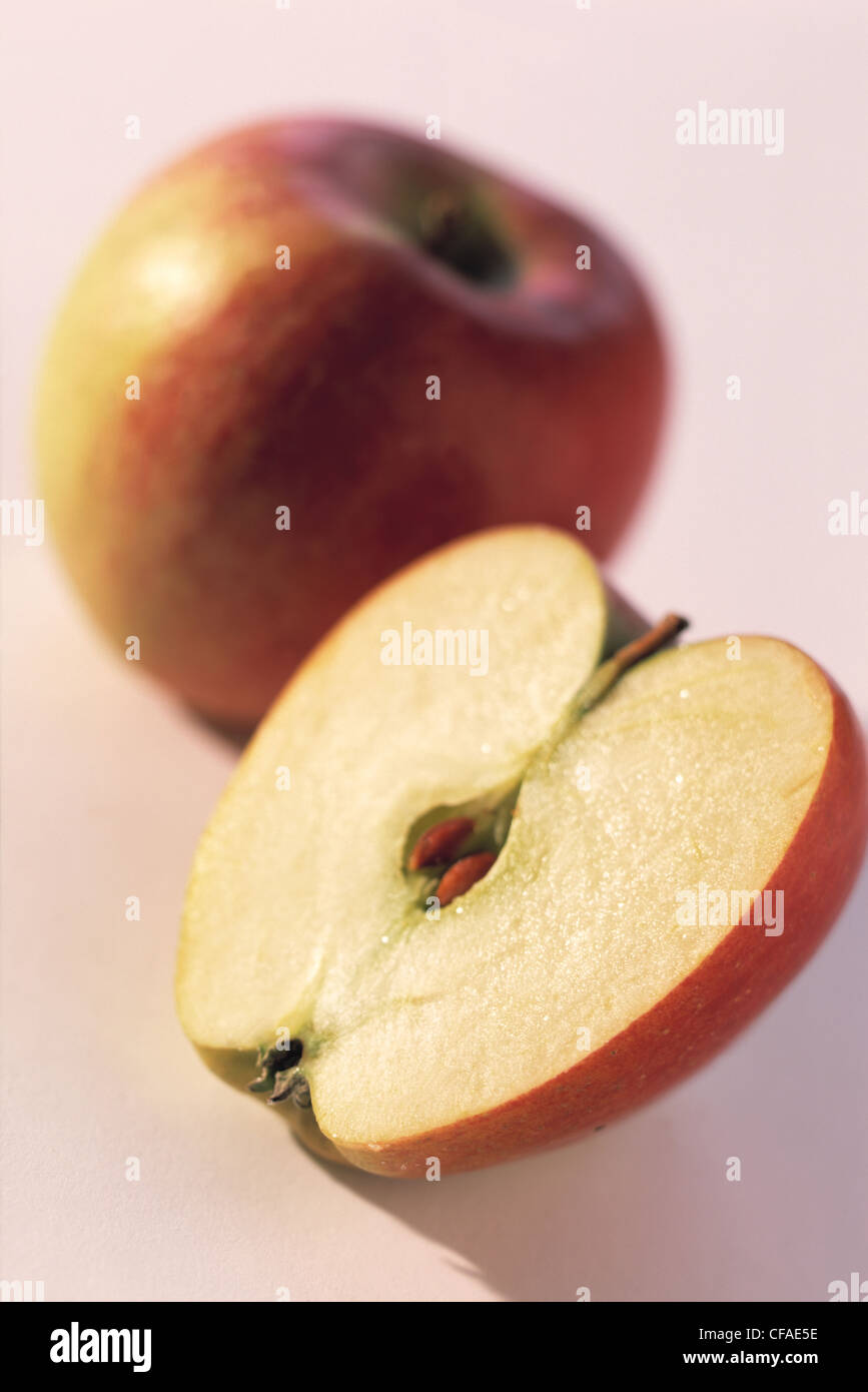 Still: Apple, in whole and halved Stock Photo - Alamy