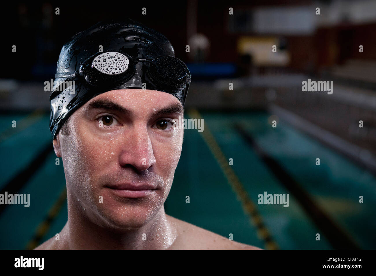 Swimmer wearing cap and goggles Stock Photo - Alamy
