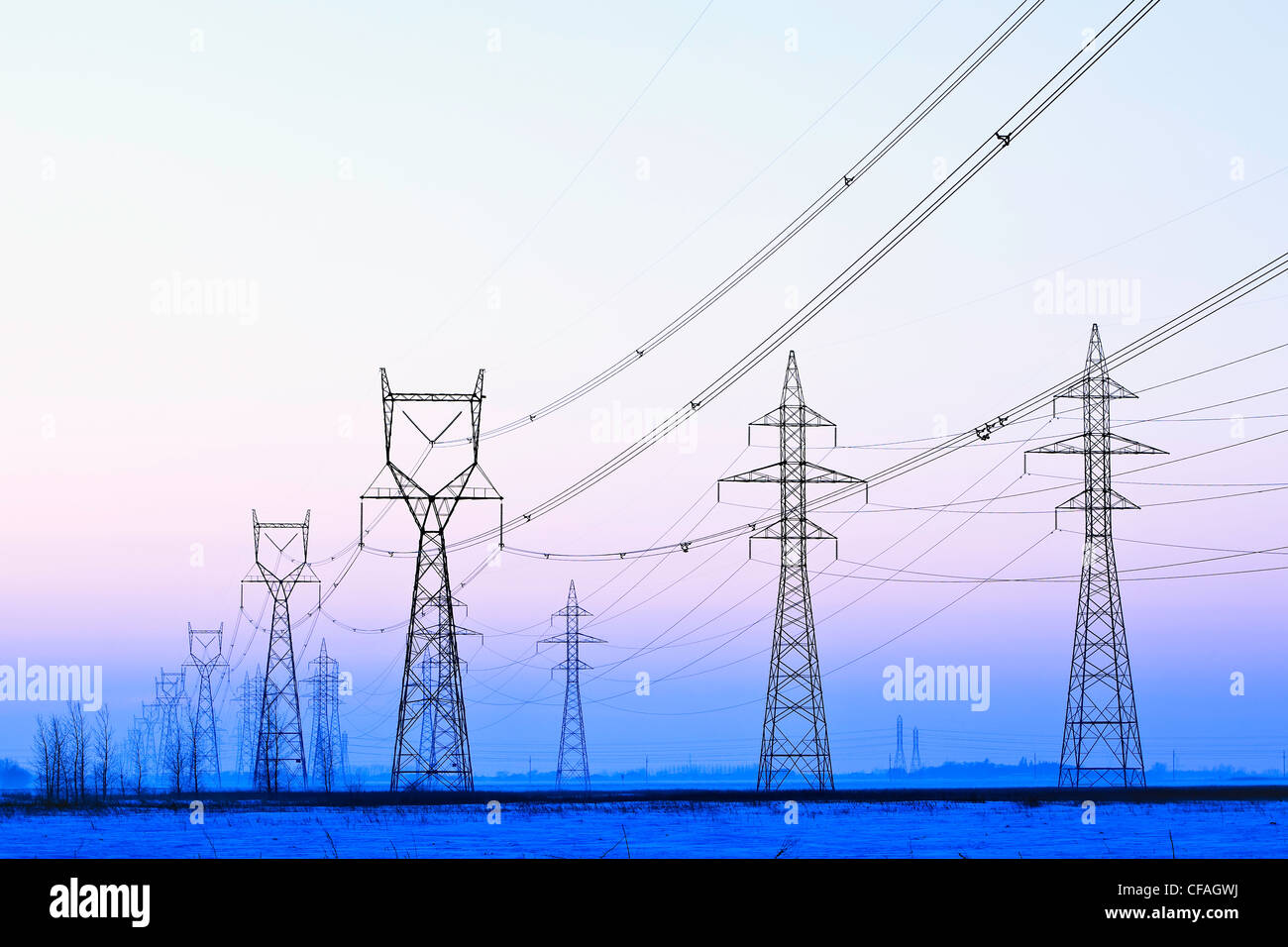 Power transmission towers at dusk. Near Winnipeg, Manitoba, Canada ...