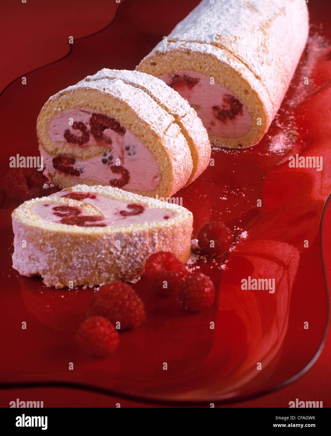 Sponge - roll with raspberry - cream Stock Photo - Alamy