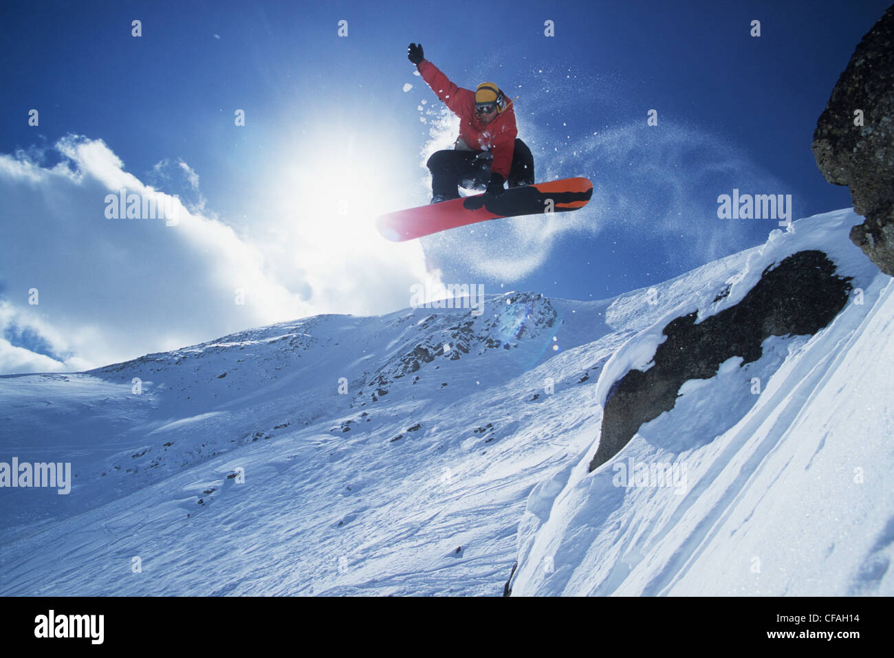 A snowboarder catching air at Lake Louise Resort, Alberta, Canada Stock ...
