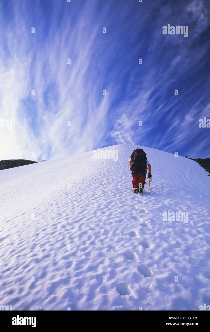 Man heading up the South Ridge of Fissle Peak, Garibaldi Provincial ...