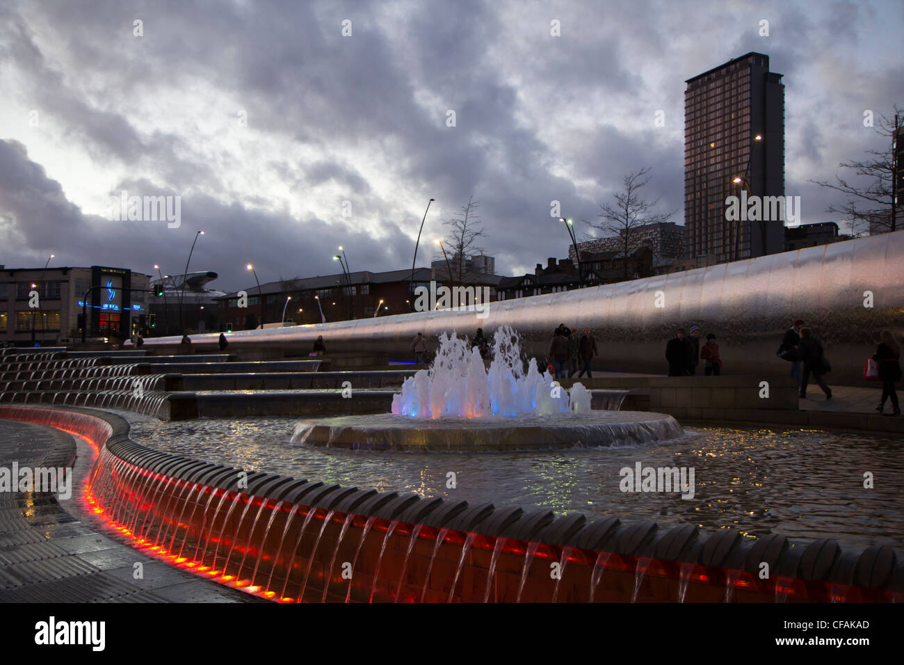 Sheffield train station at night with illuminated fountains and water ...