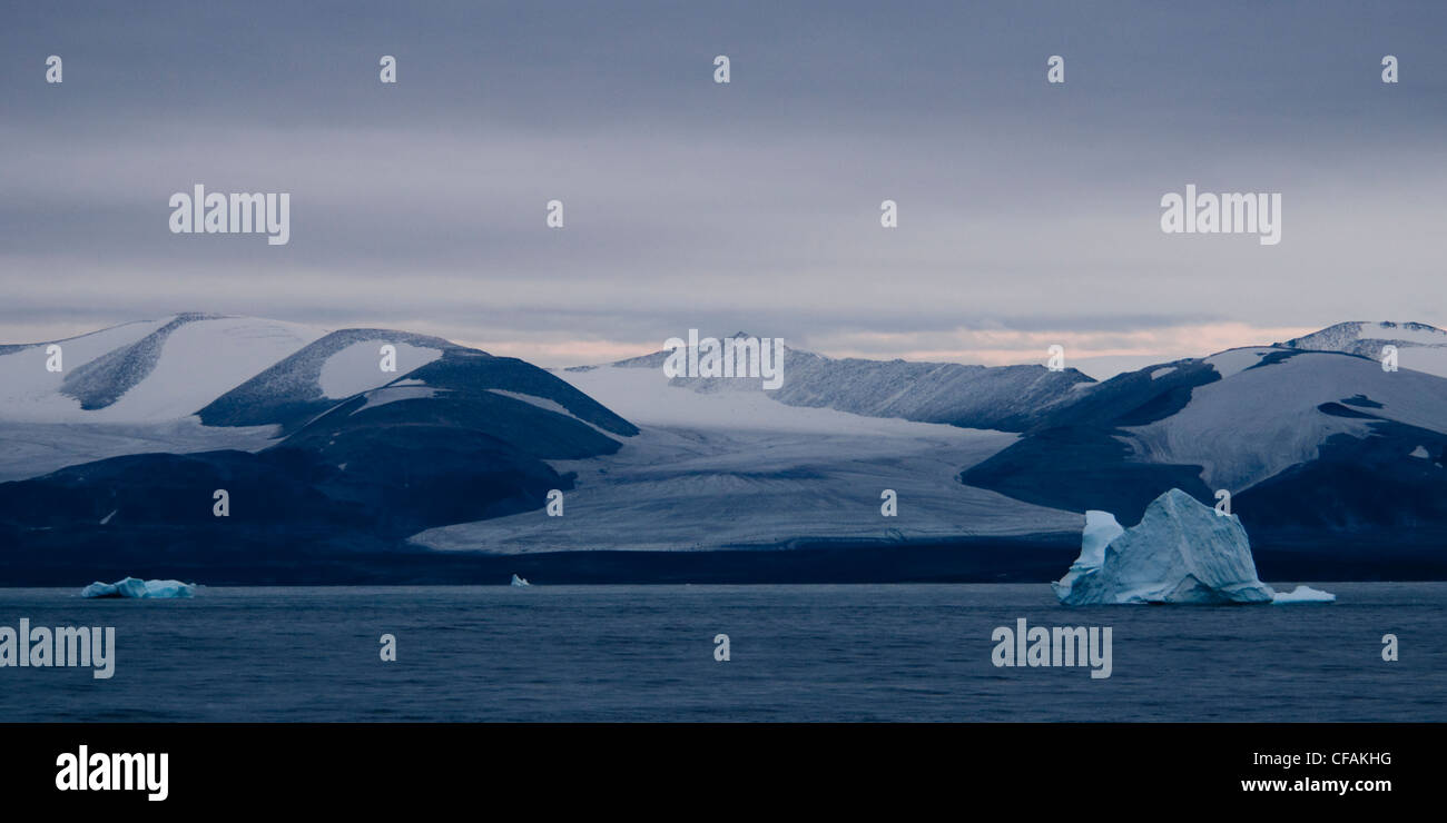 Icebergs and glacier at dusk, Baffin Island, near Pond Inlet, Nunavut ...