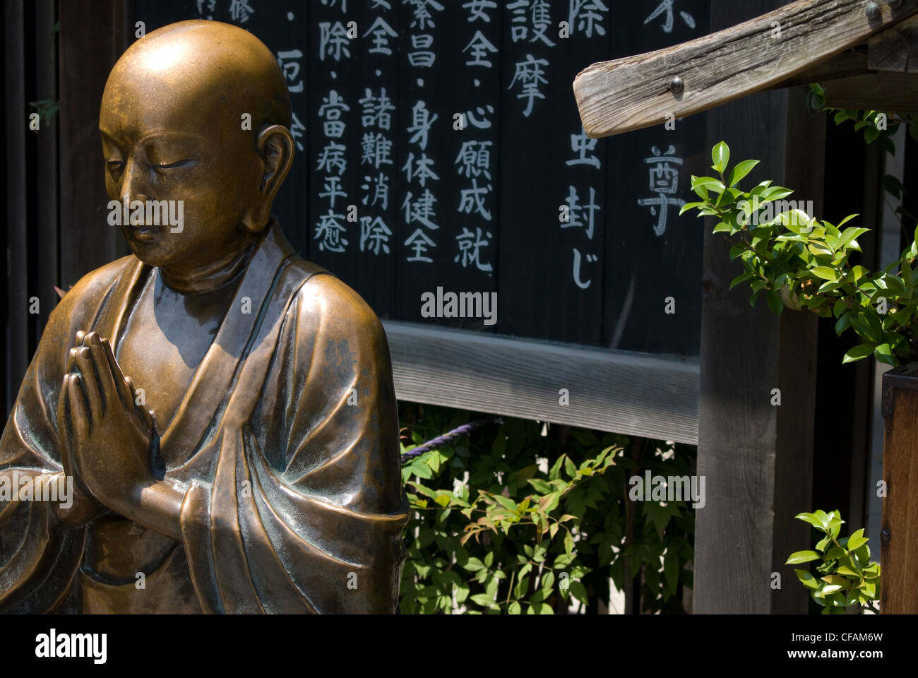 Buddhist statue at Senso-Ji Temple in Asakua, Tokyo, Japan Stock Photo ...