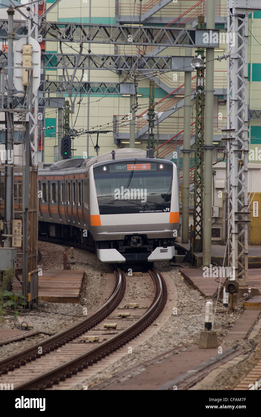 Commuter train entering Kanda station, Tokyo, Japan Stock Photo - Alamy