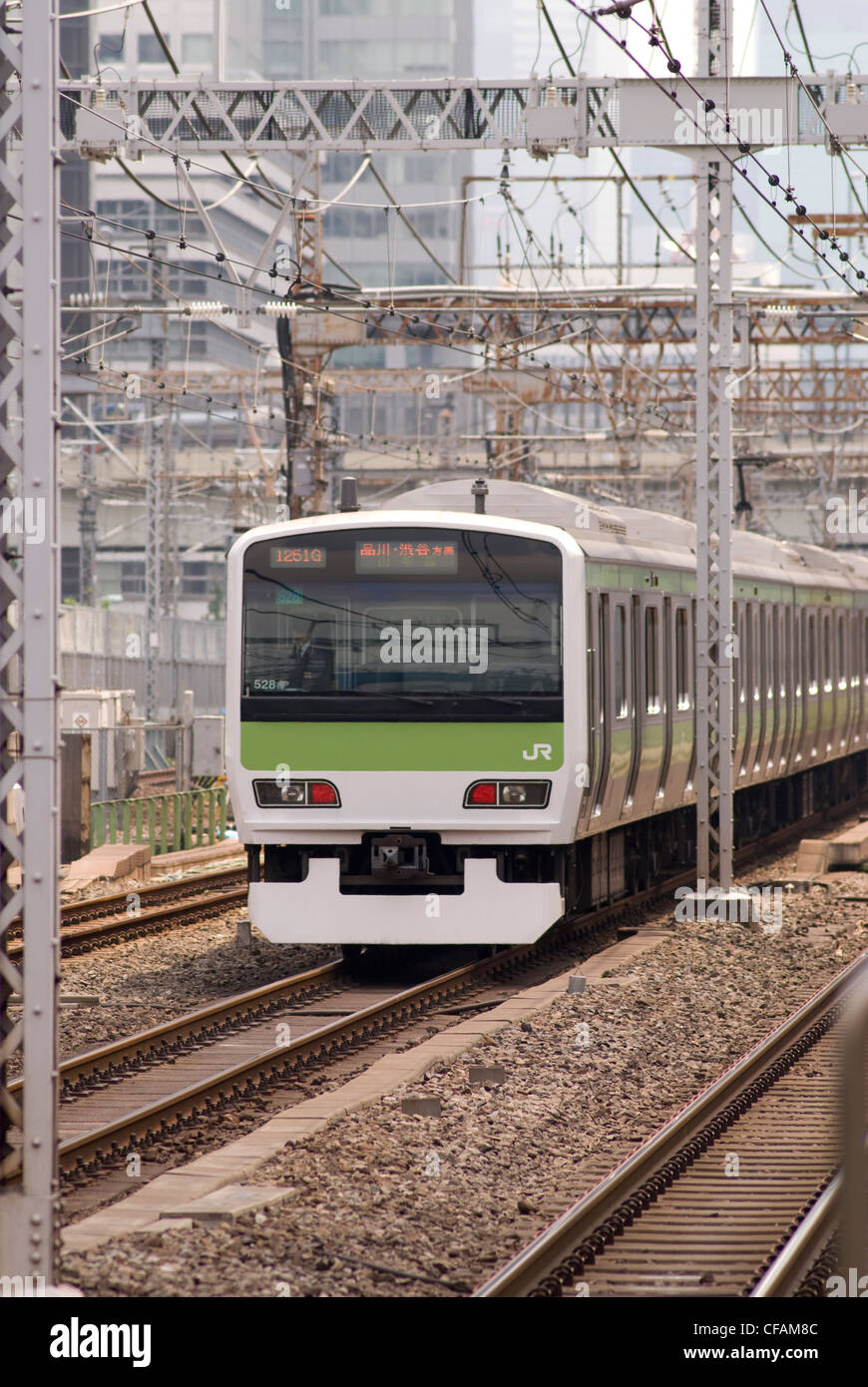 Commuter train entering Kanda station, Tokyo, Japan Stock Photo - Alamy