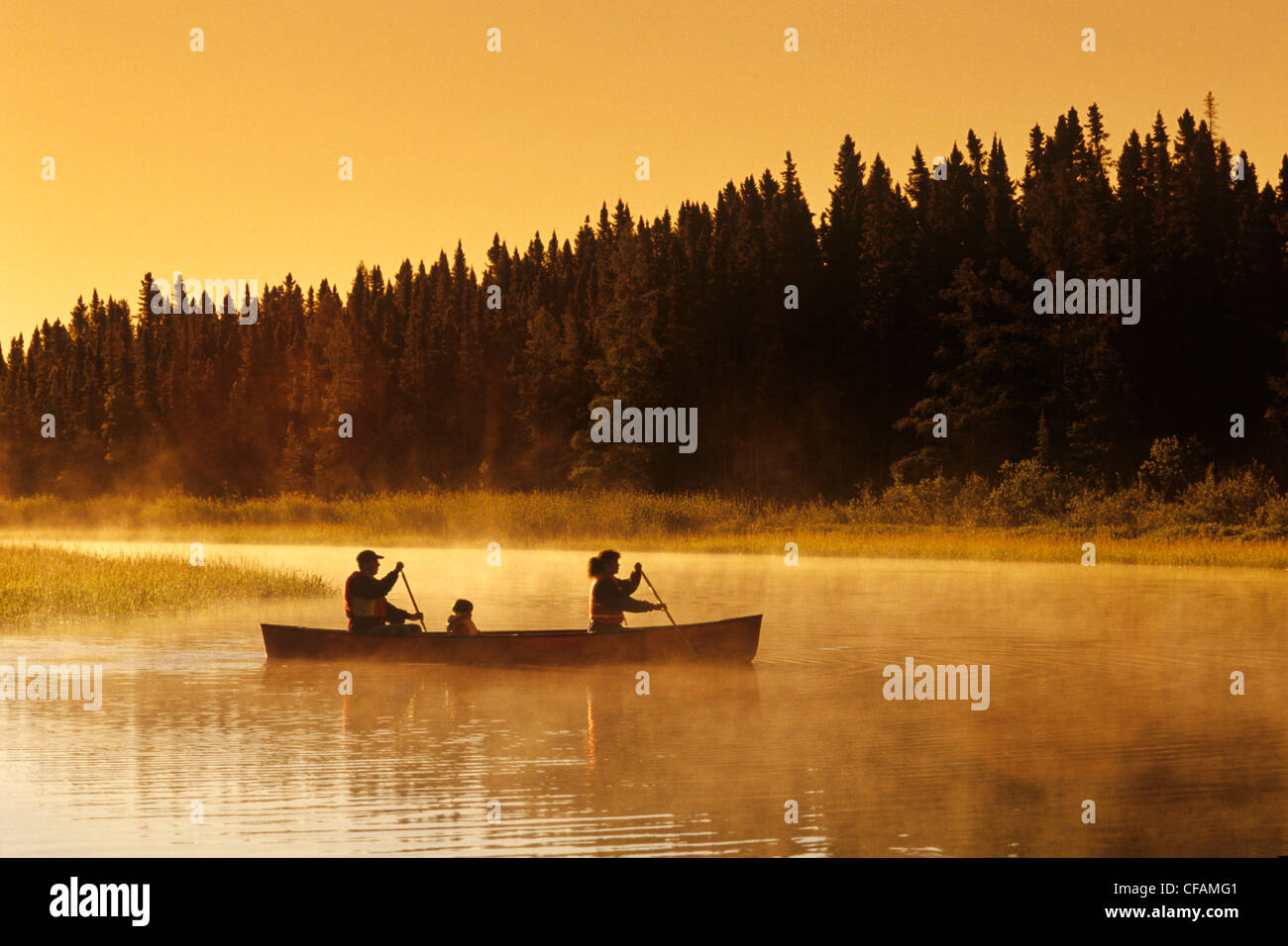 family canoeing, Whiteshell River, Whiteshell Provincial Park, Manitoba ...