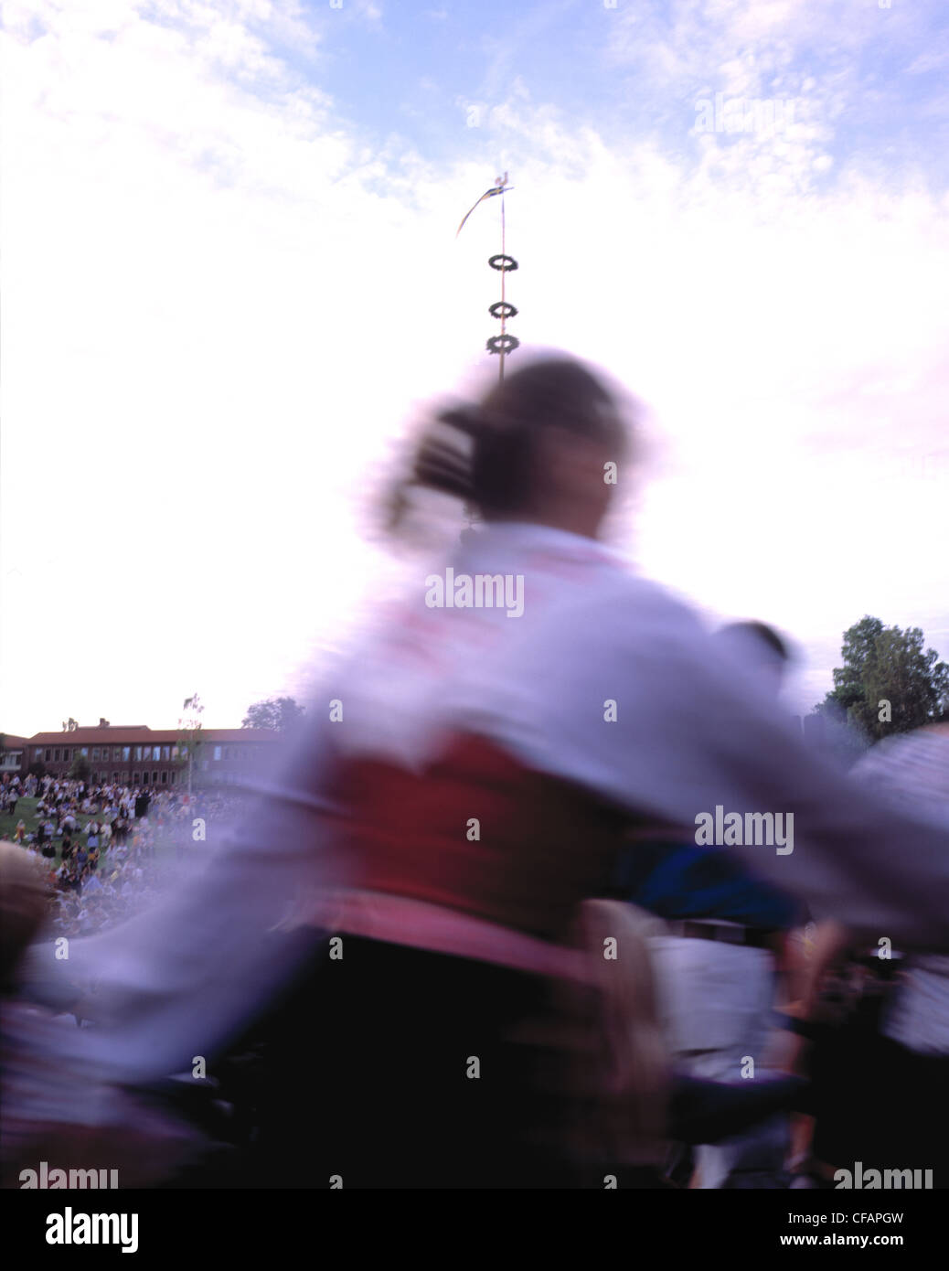 Midsommer: woman dancing round the midsommertree Stock Photo - Alamy